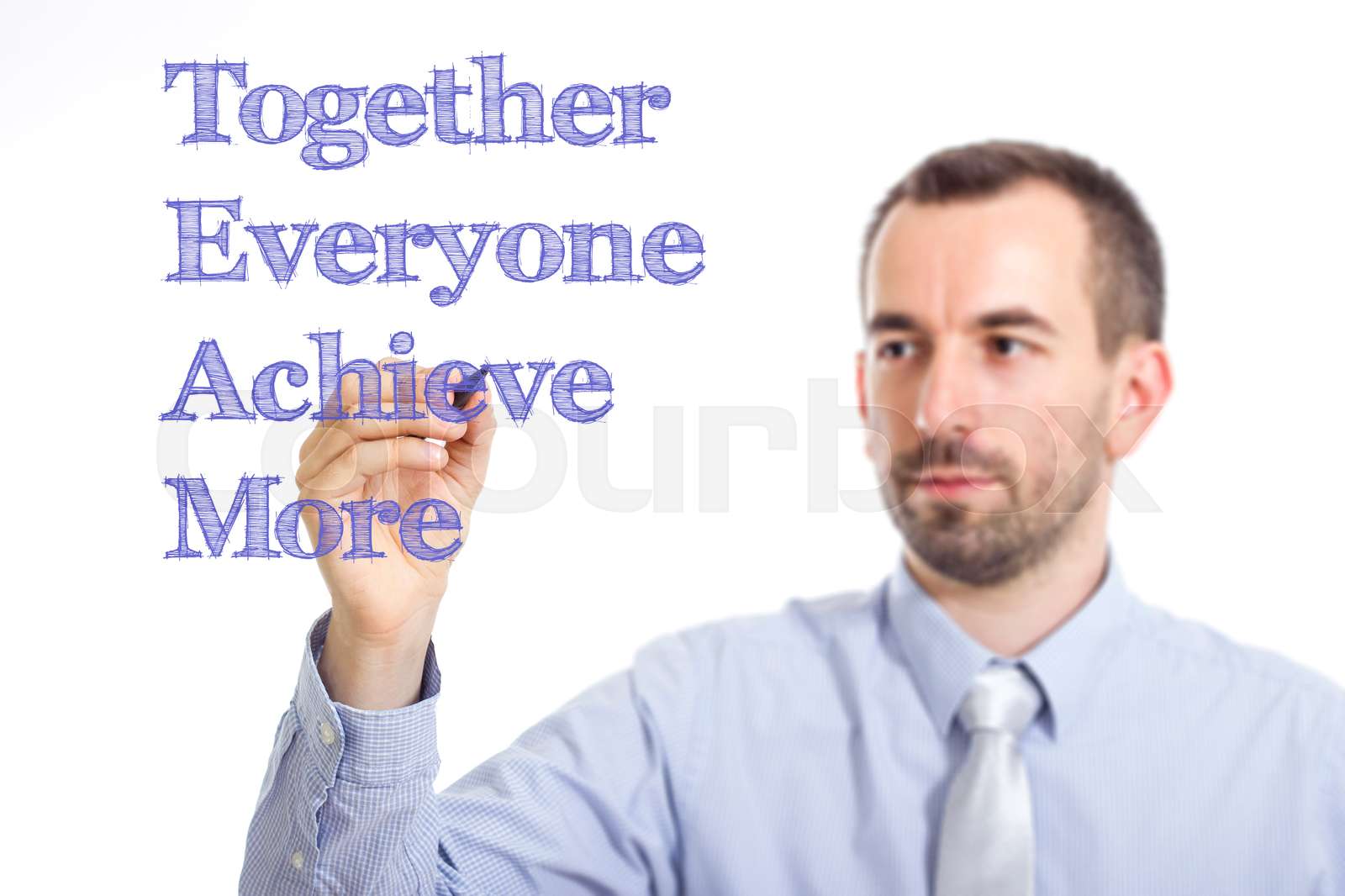 Together Everyone Achieve More TEAM - Young businessman writing blue ...