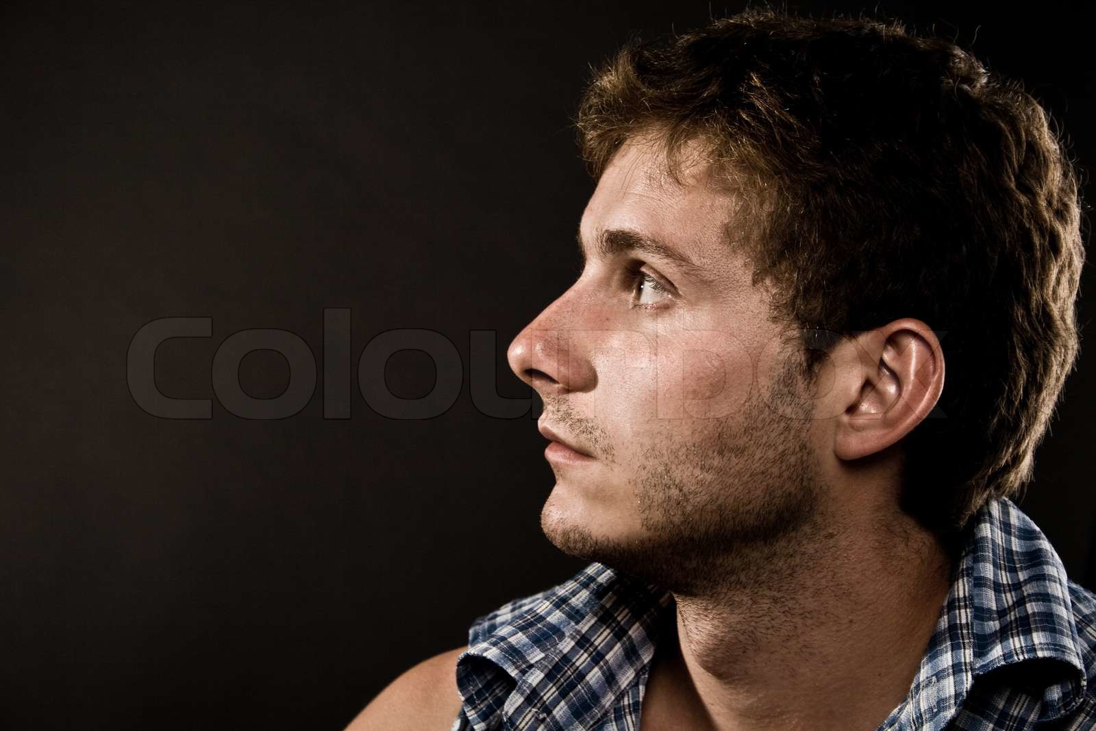 Face of a young boy in profile | Stock image | Colourbox