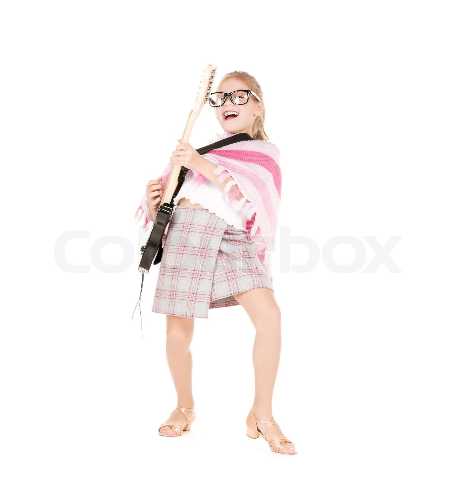 billede af sjove pige i specs med elektrisk guitar | Stock foto | Colourbox