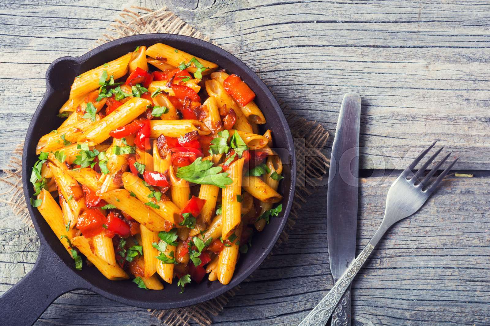 Penne pasta in pan | Stock image | Colourbox