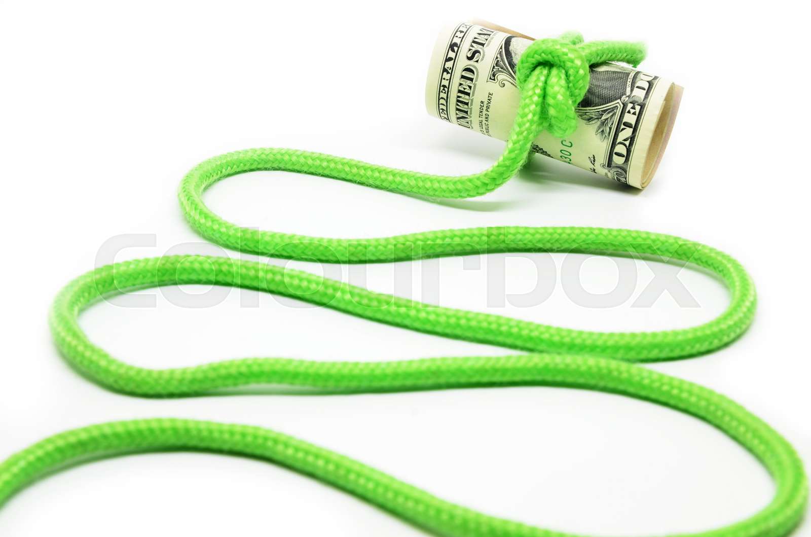 Roll of hundred dollar bills related rope in knot | Stock image | Colourbox
