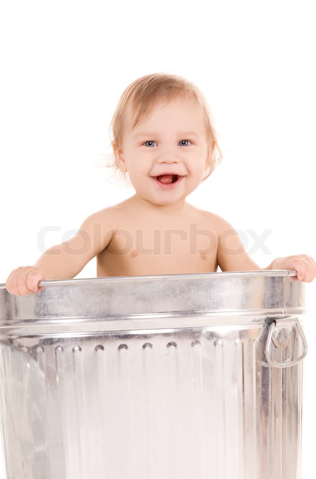 picture of adorable baby in trash can | Stock image | Colourbox