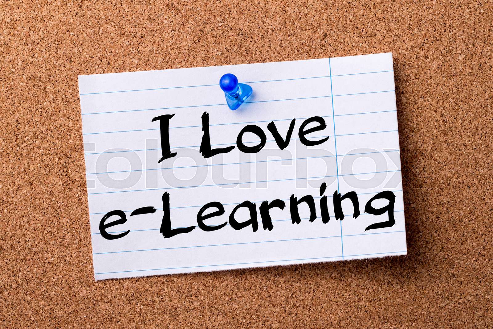 I Love e-Learning - teared note paper pinned on bulletin board | Stock image | Colourbox