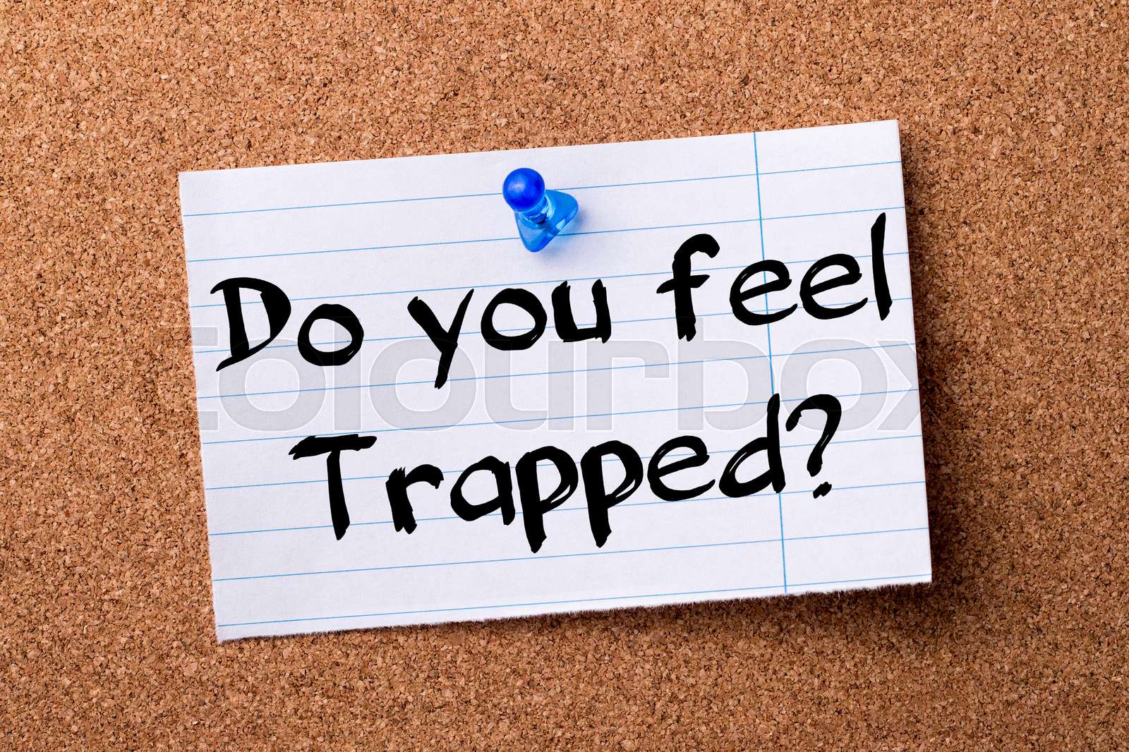 Do you feel Trapped? - teared note paper pinned on bulletin board ...
