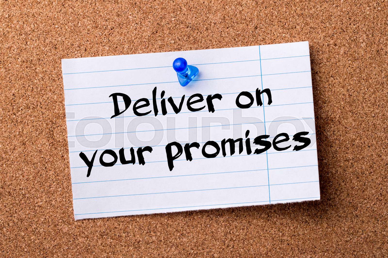 Deliver on your promises - teared note paper pinned on bulletin board ...