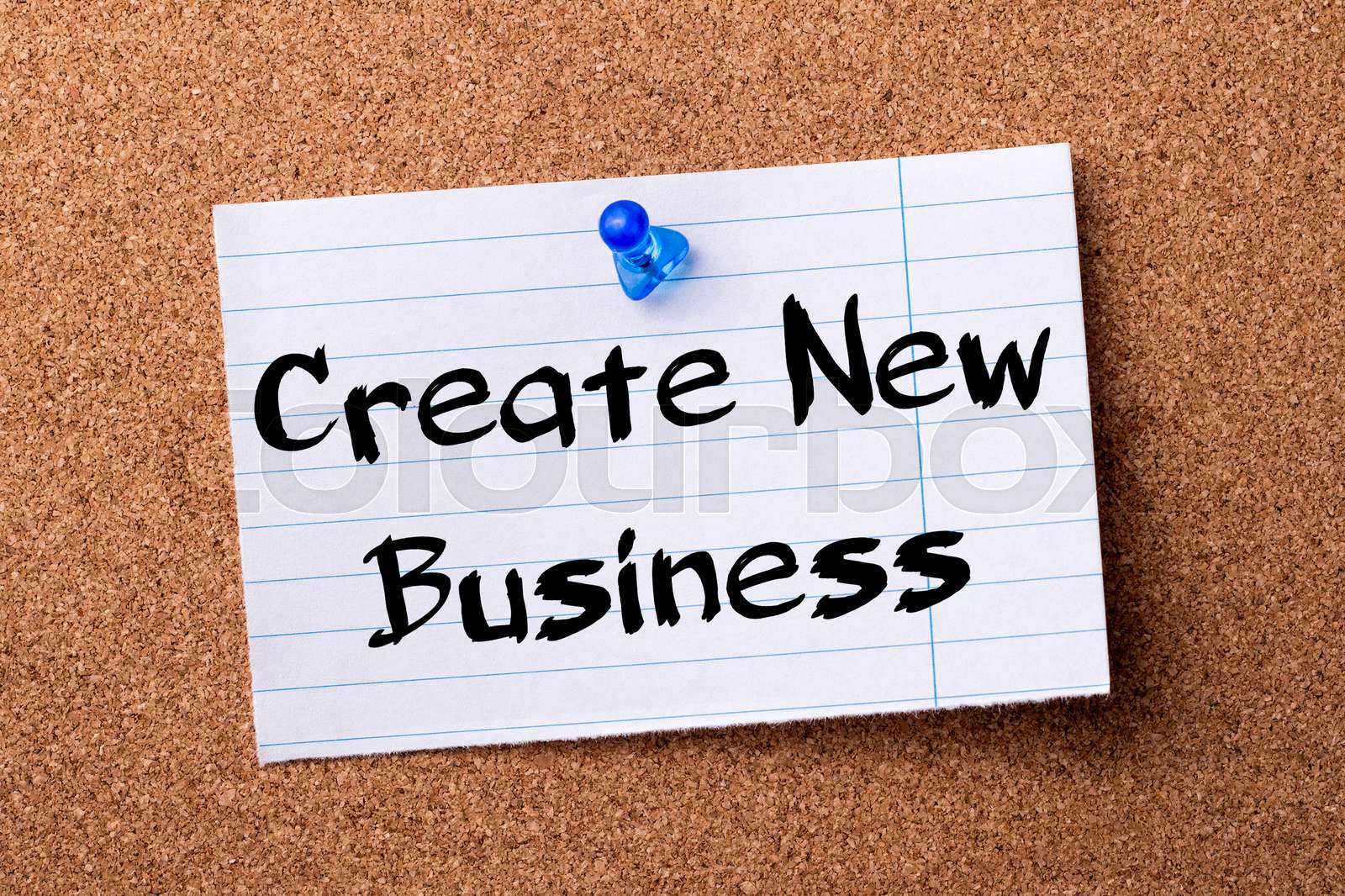 Create New Business - teared note paper pinned on bulletin board ...