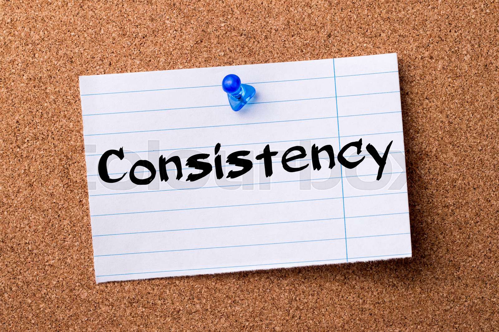 Consistency - teared note paper pinned on bulletin board | Stock image ...