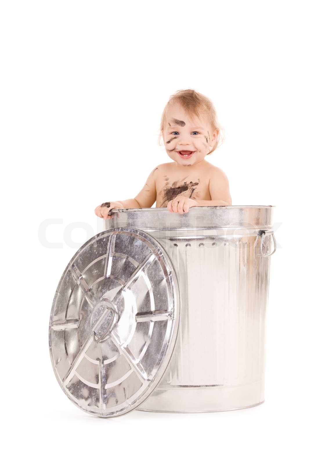 picture of adorable baby in trash can | Stock image | Colourbox