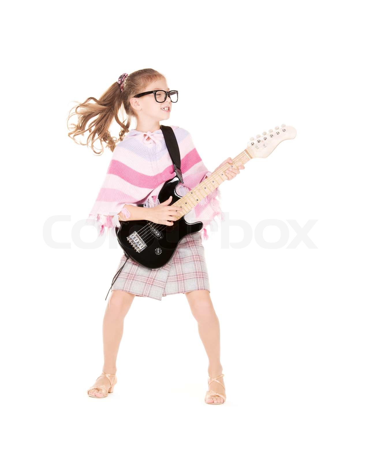 billede af sjove pige i specs med elektrisk guitar | Stock foto | Colourbox