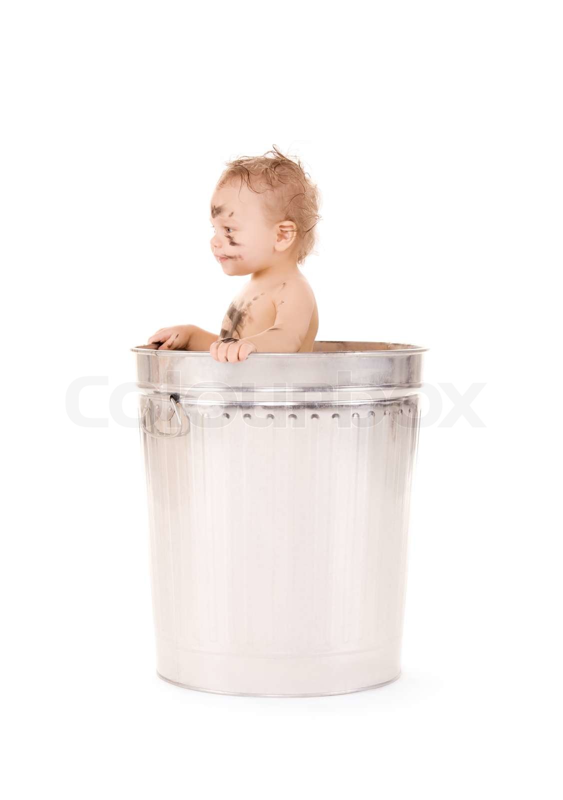 picture of adorable baby in trash can | Stock image | Colourbox