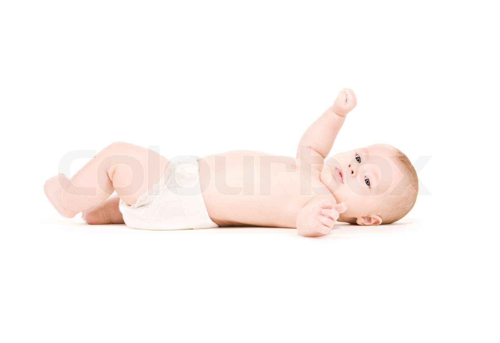 Bild der Verlegung Baby in der Windel over white | Stock Bild | Colourbox