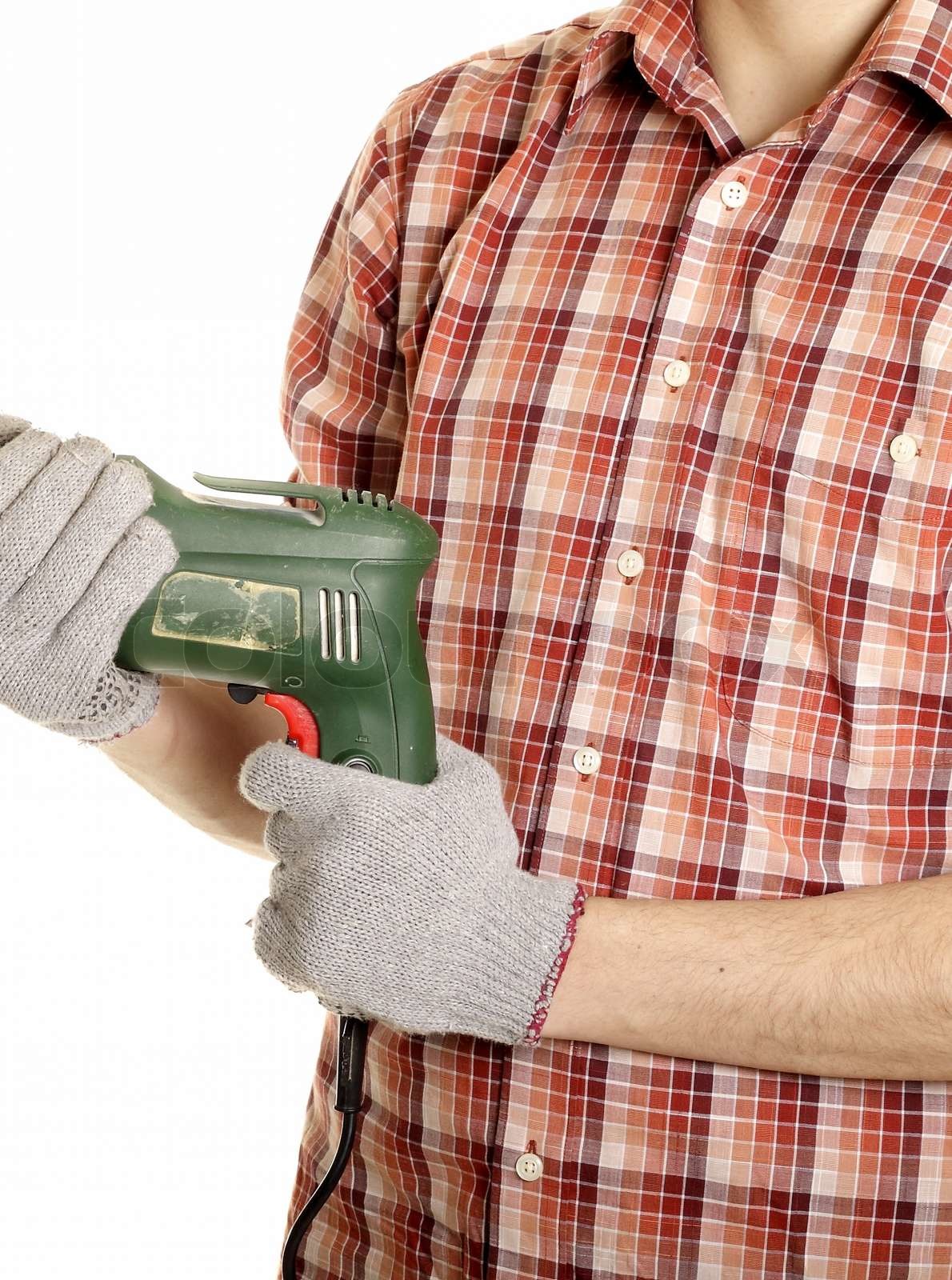 hands handling an electric drilling machine isolated | Stock image ...