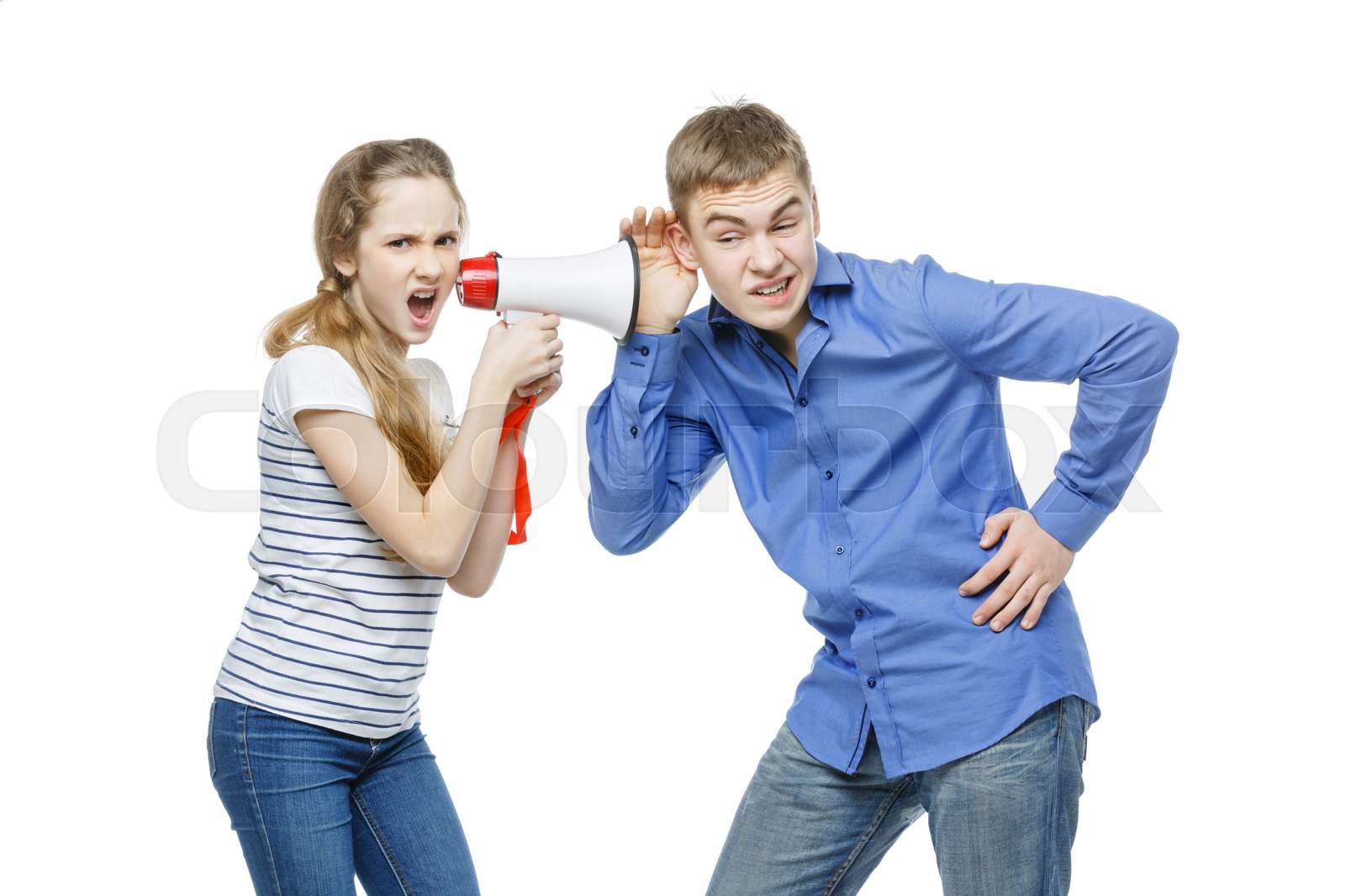 Sister screaming at brother | Stock image | Colourbox