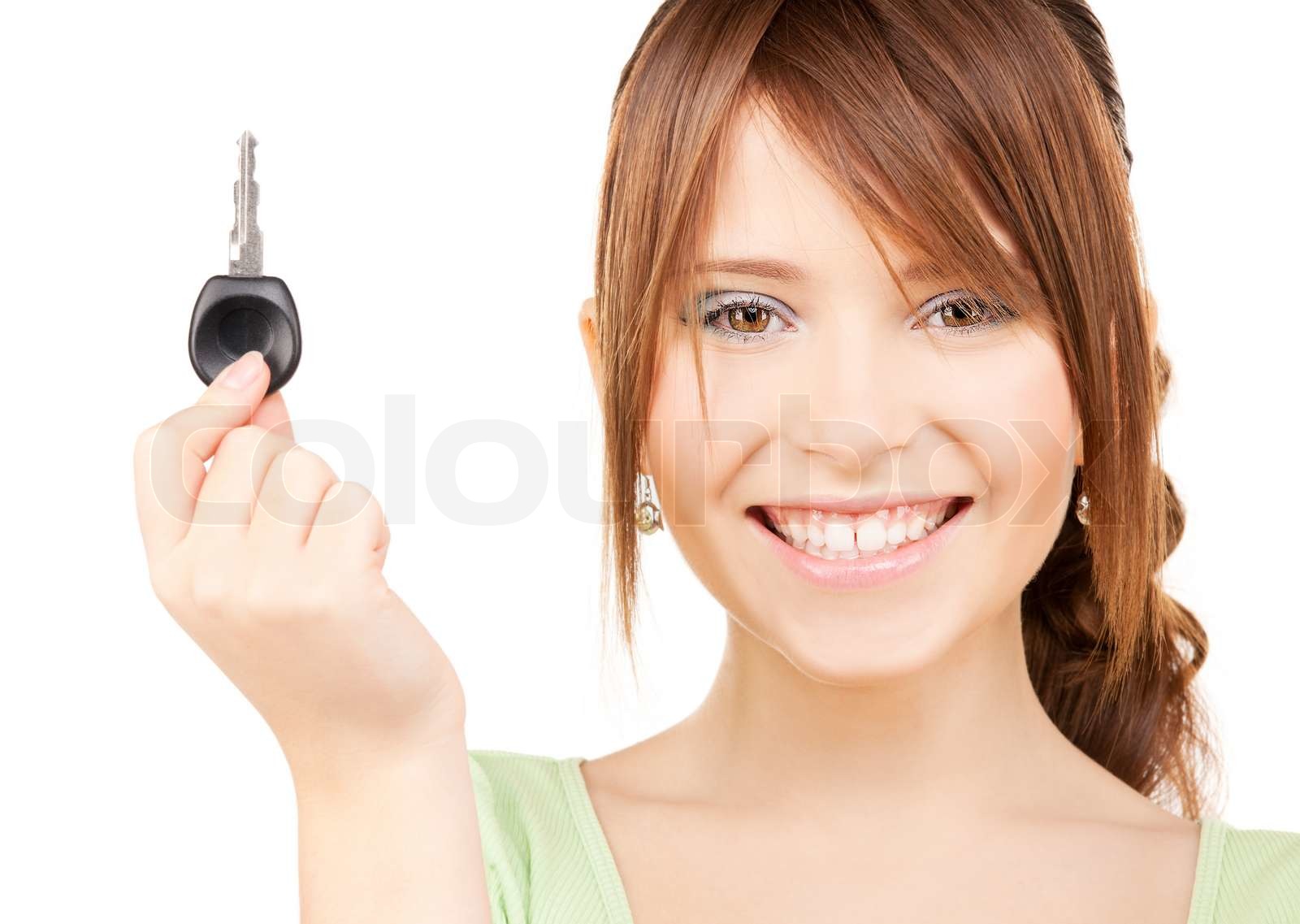 picture of happy teenage girl with key | Stock image | Colourbox
