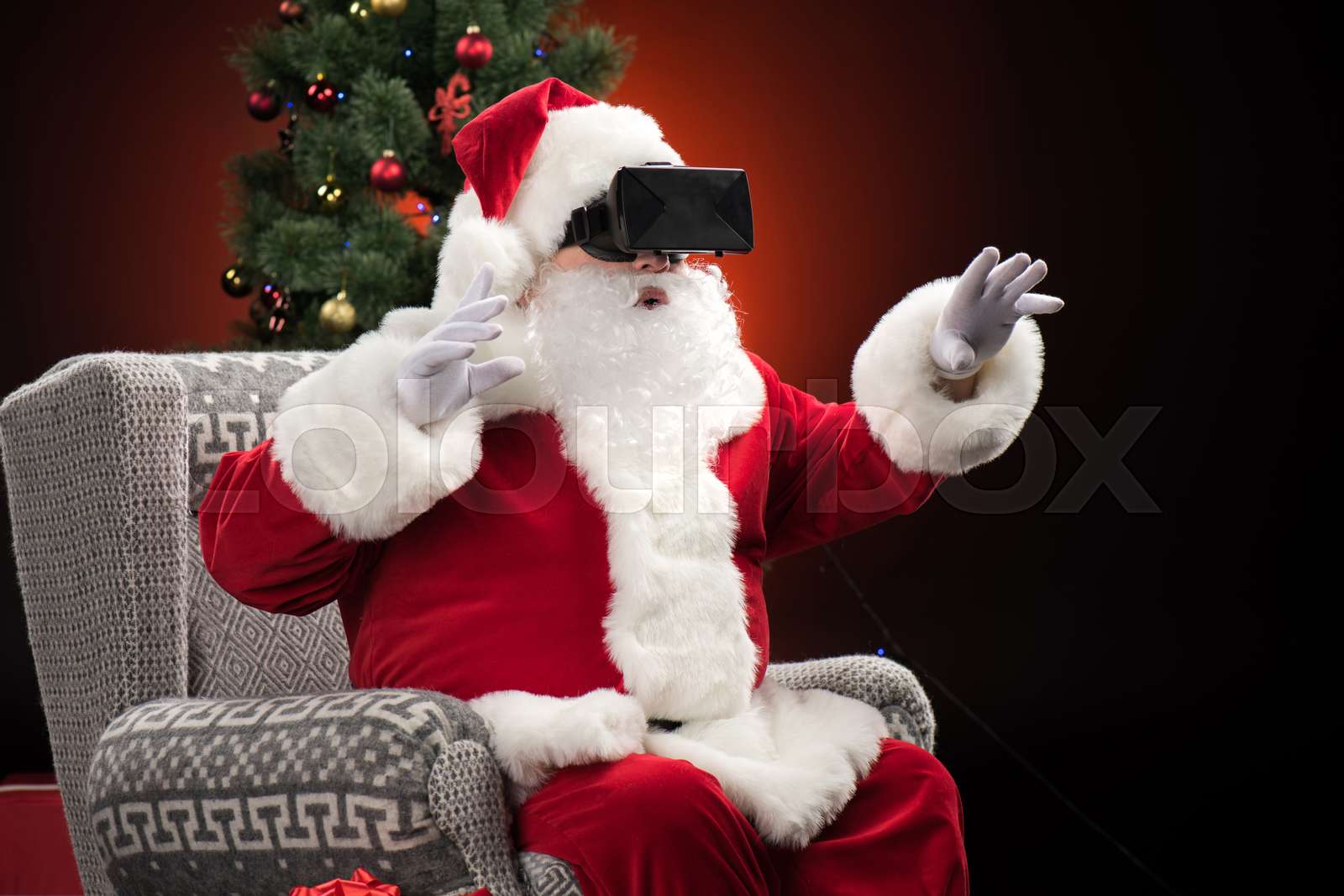 Santa Claus wearing virtual reality headset | Stock image | Colourbox