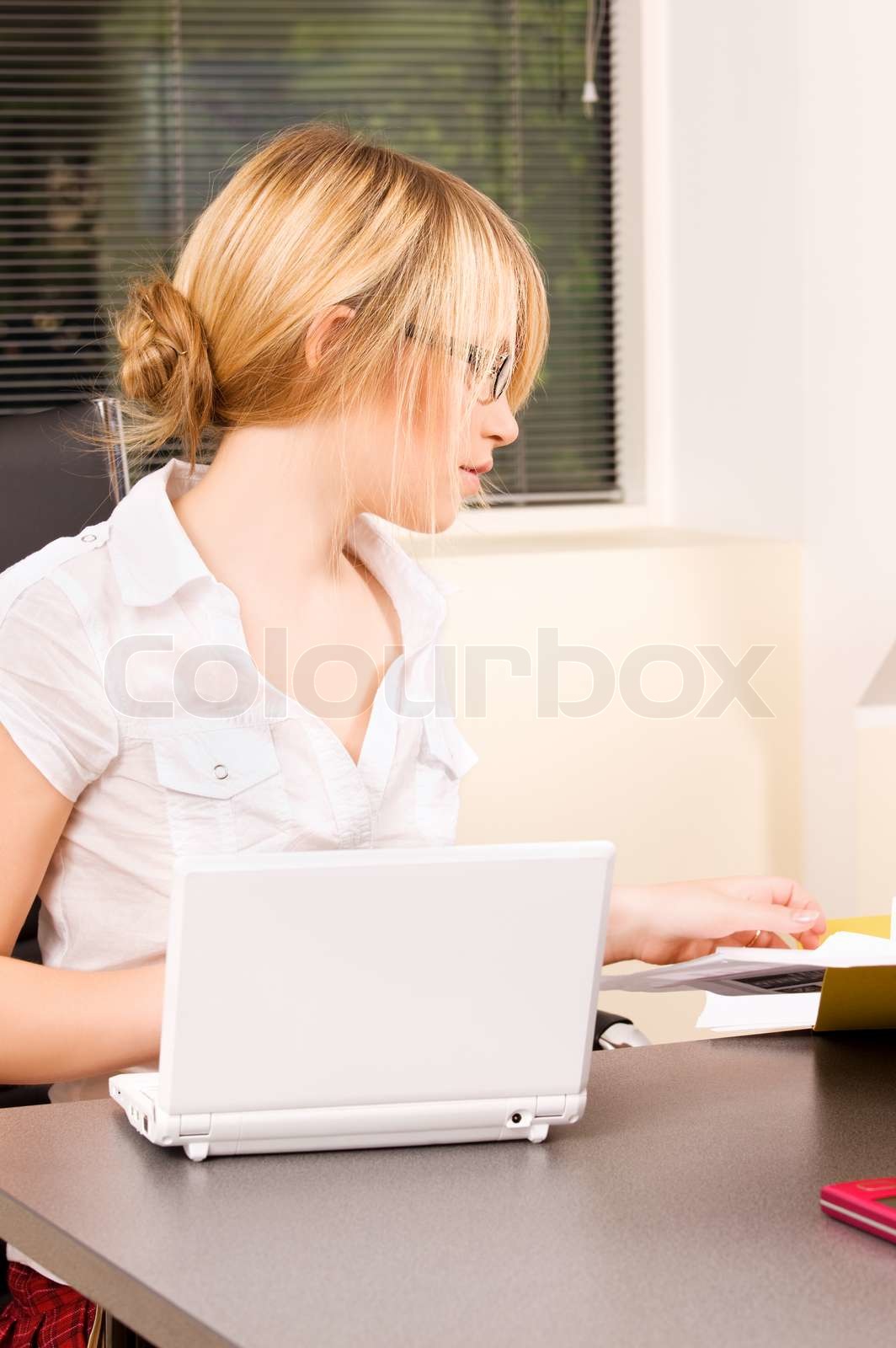 picture of office girl with laptop computer | Stock image | Colourbox