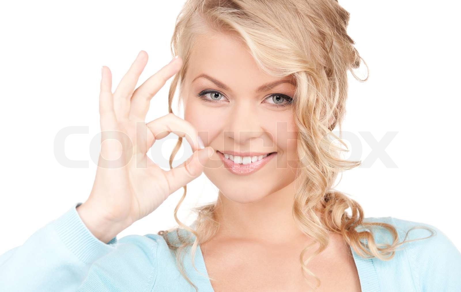 bright picture of lovely blonde showing ok sign | Stock image | Colourbox
