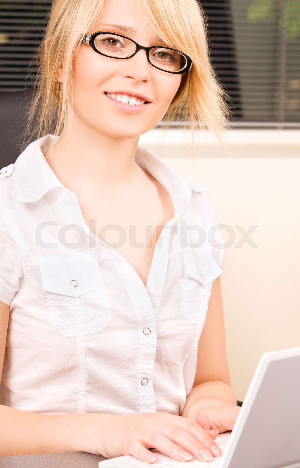 picture of office girl with laptop computer | Stock image | Colourbox