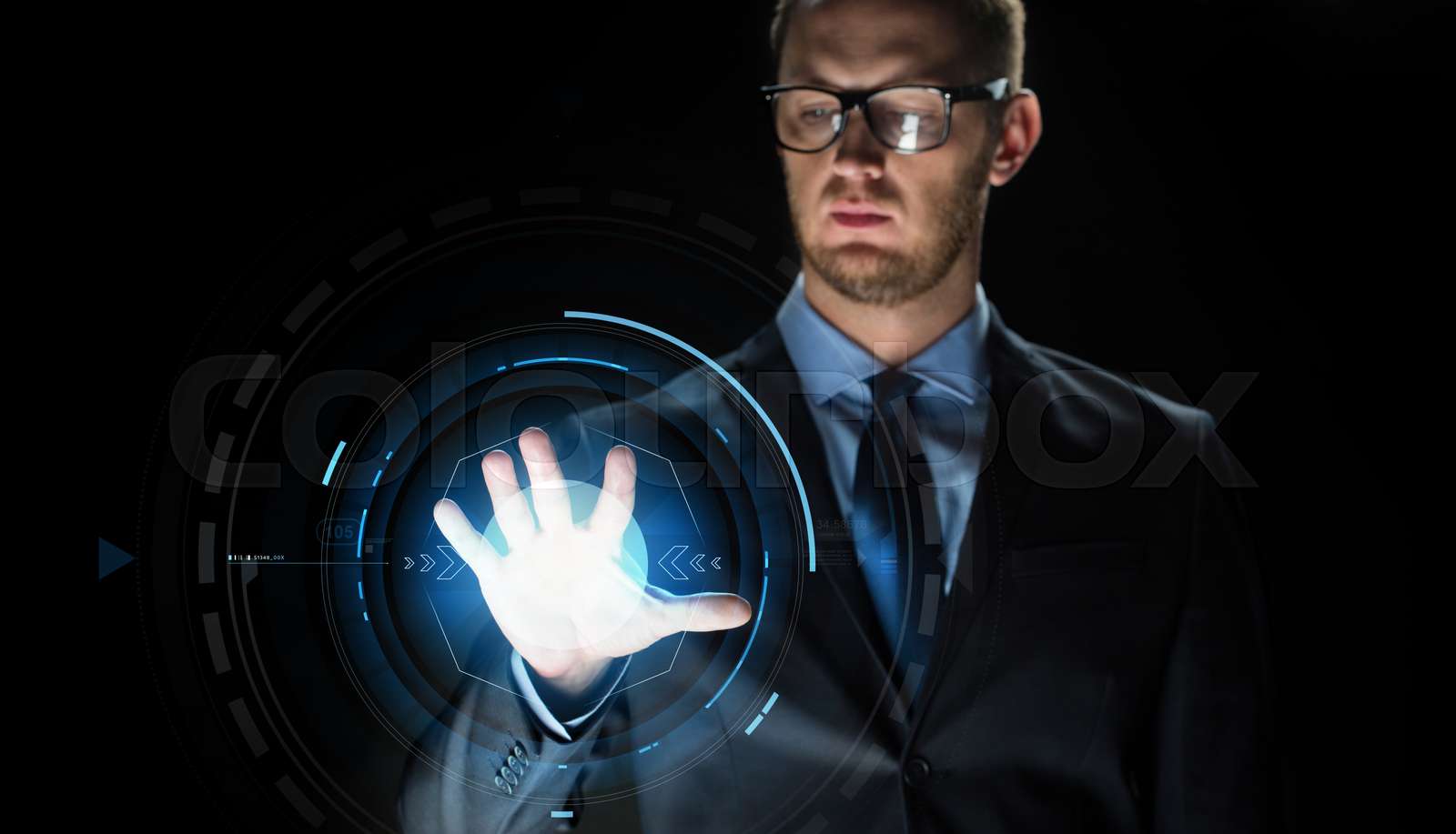 businessman touching virtual screen projection | Stock image | Colourbox