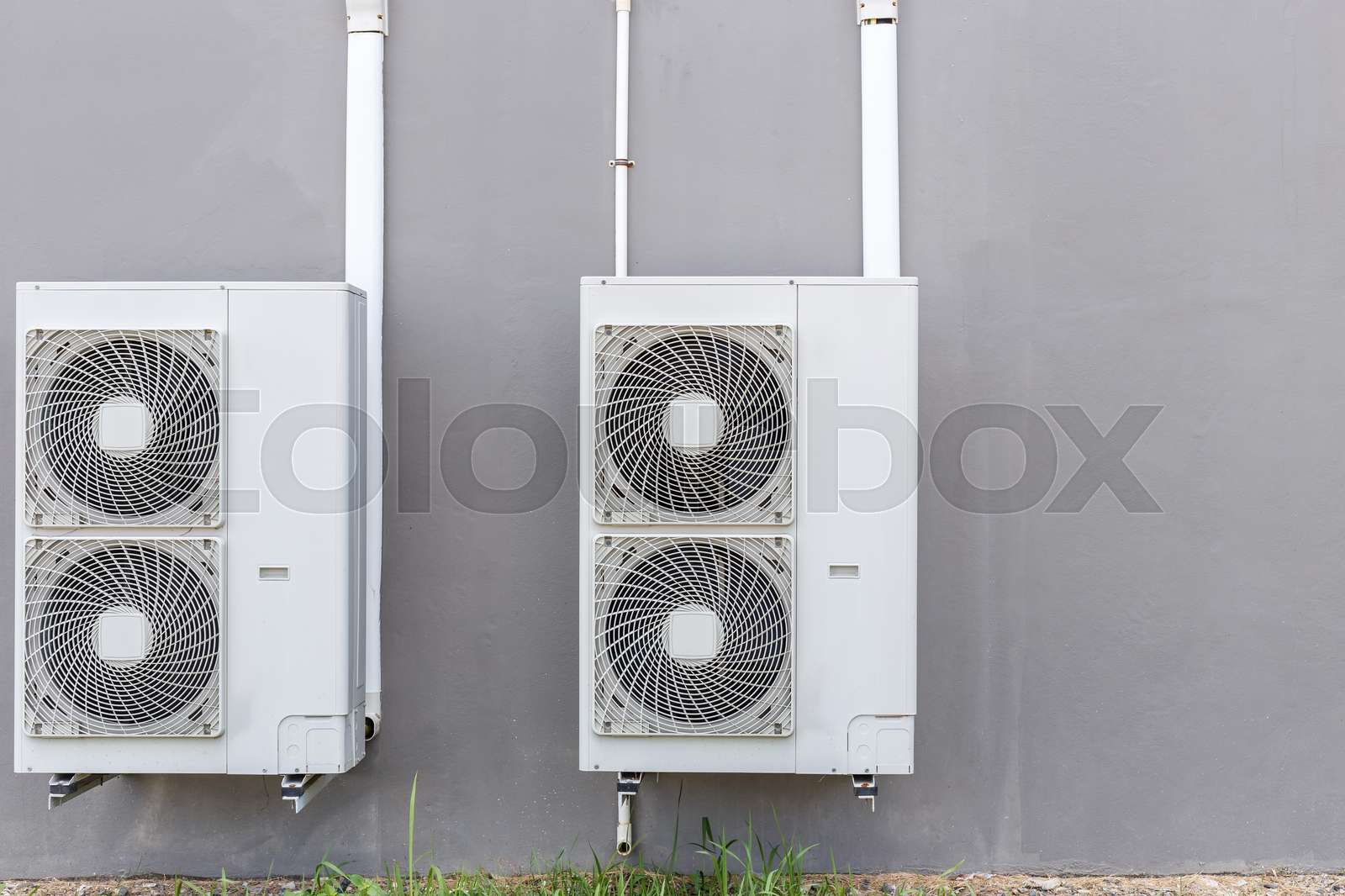 Air conditioning compressor installed the wall | Stock image | Colourbox