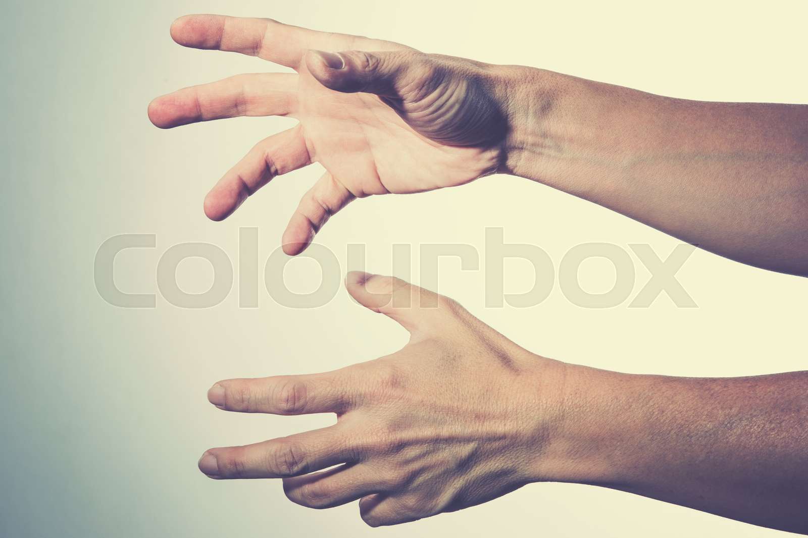 Two Hands Reaching For Each Other