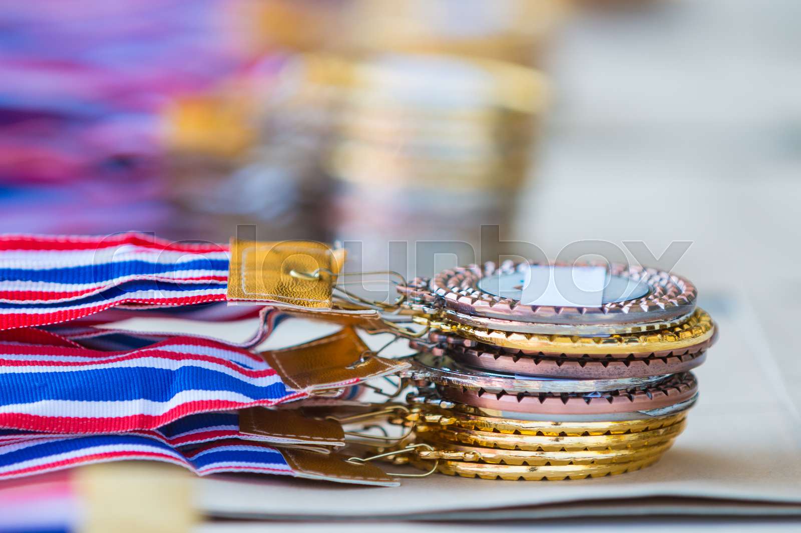 stacks of gold, silver, and bronze medals | Stock image | Colourbox