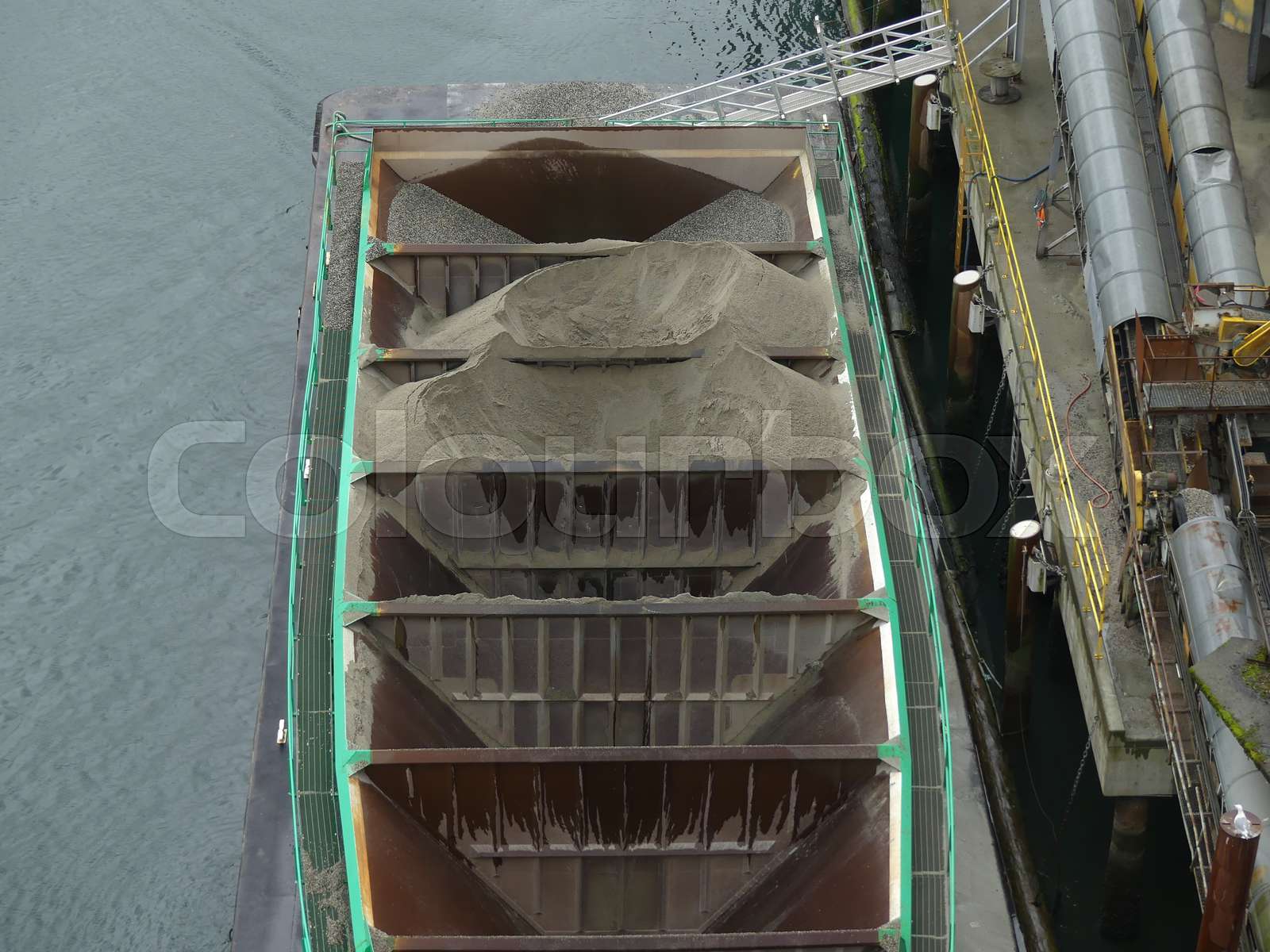 Bulk cement ship dock | Stock image | Colourbox