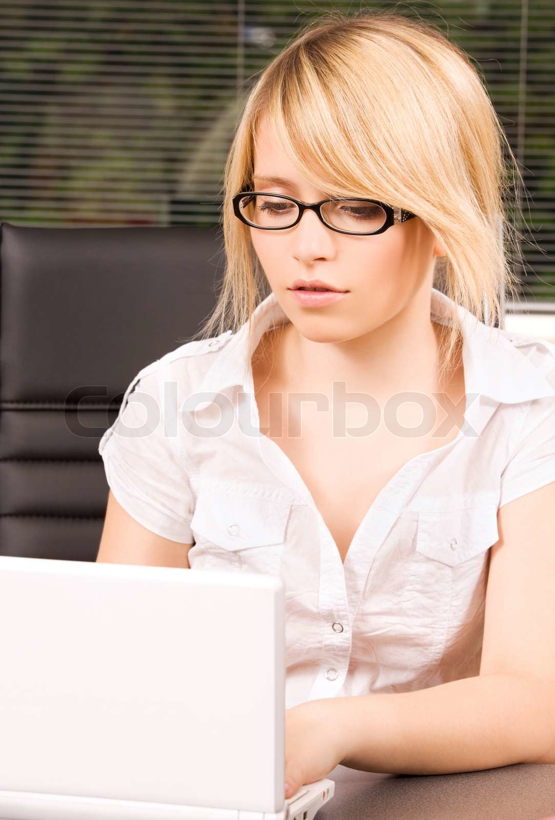 picture of office girl with laptop computer | Stock image | Colourbox