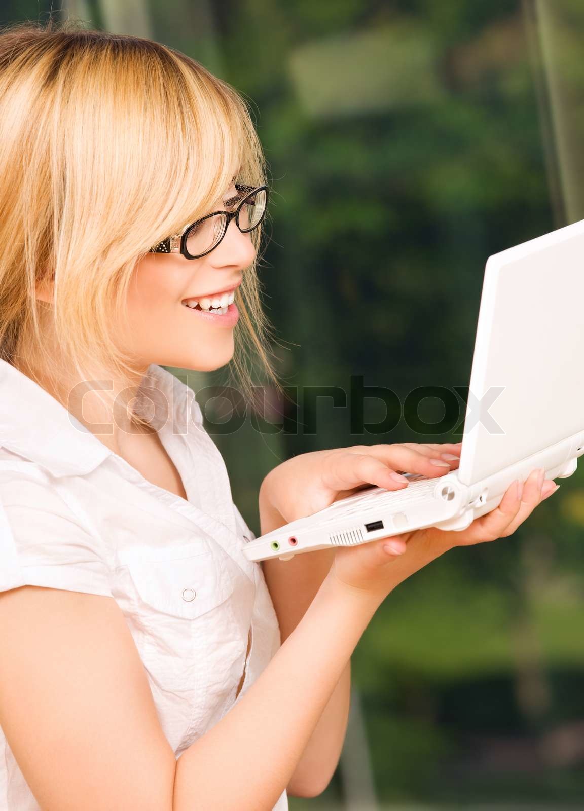 picture of office girl with laptop computer | Stock image | Colourbox