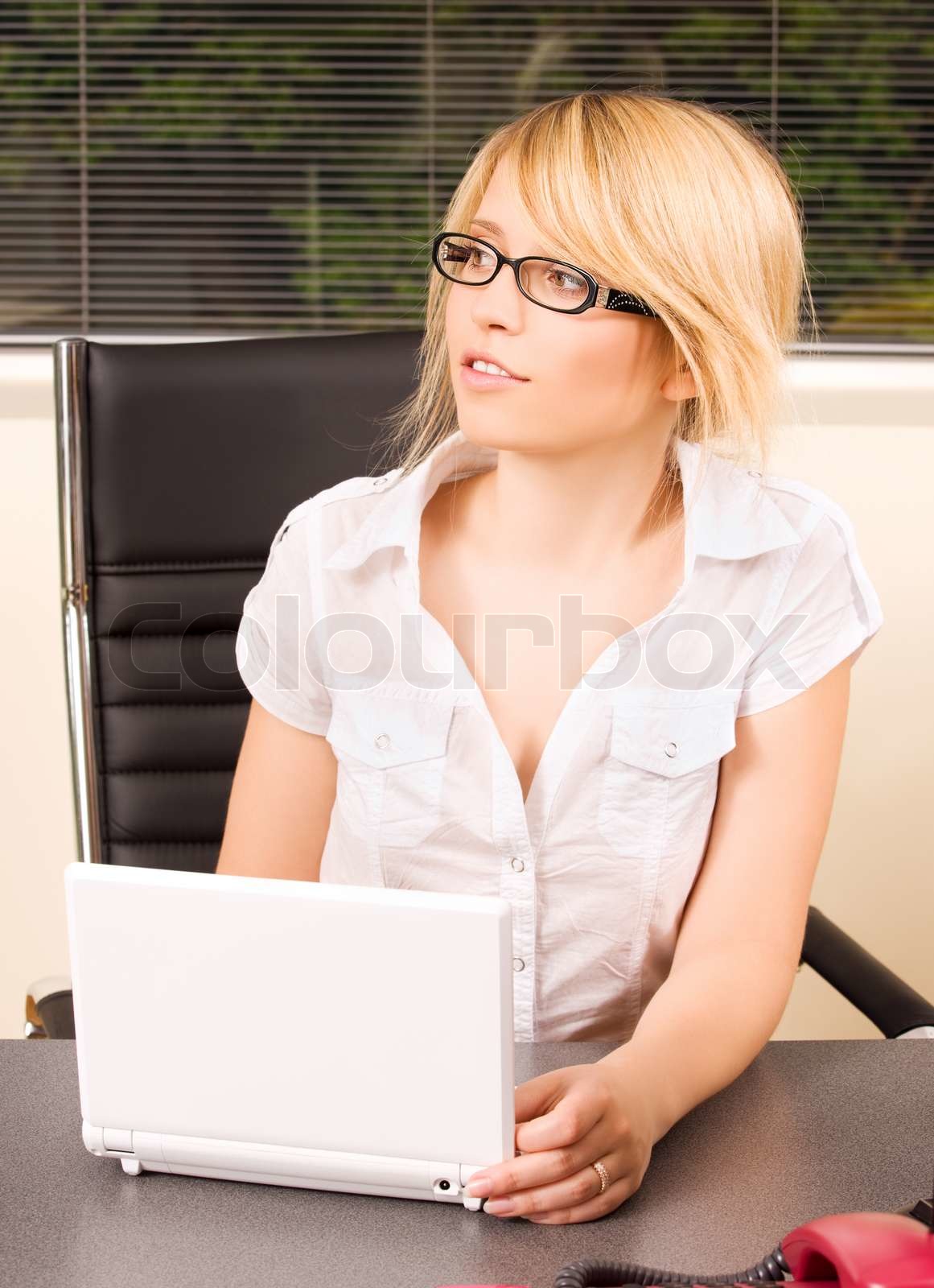 picture of office girl with laptop computer | Stock image | Colourbox