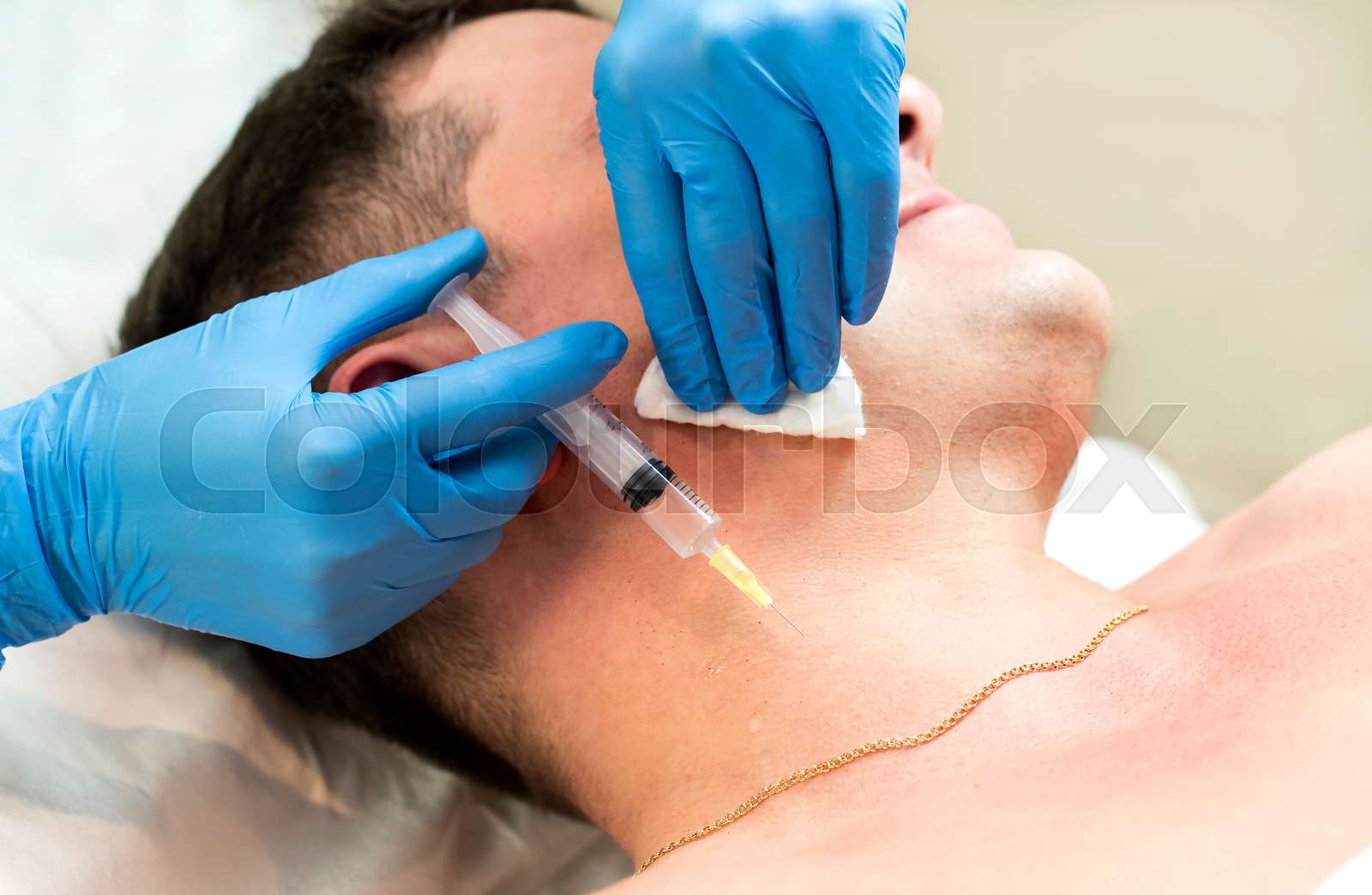 Man passes a course of mesotherapy clinic | Stock image | Colourbox