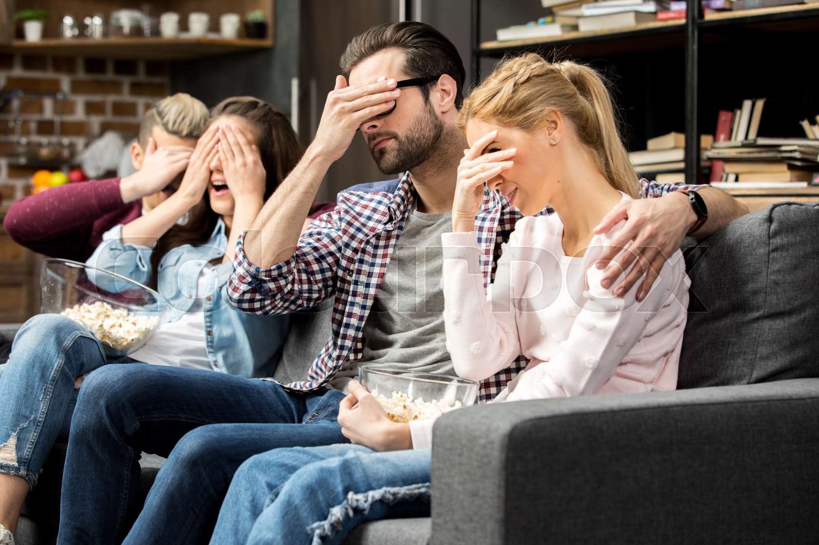 Friends covering their eyes | Stock image | Colourbox