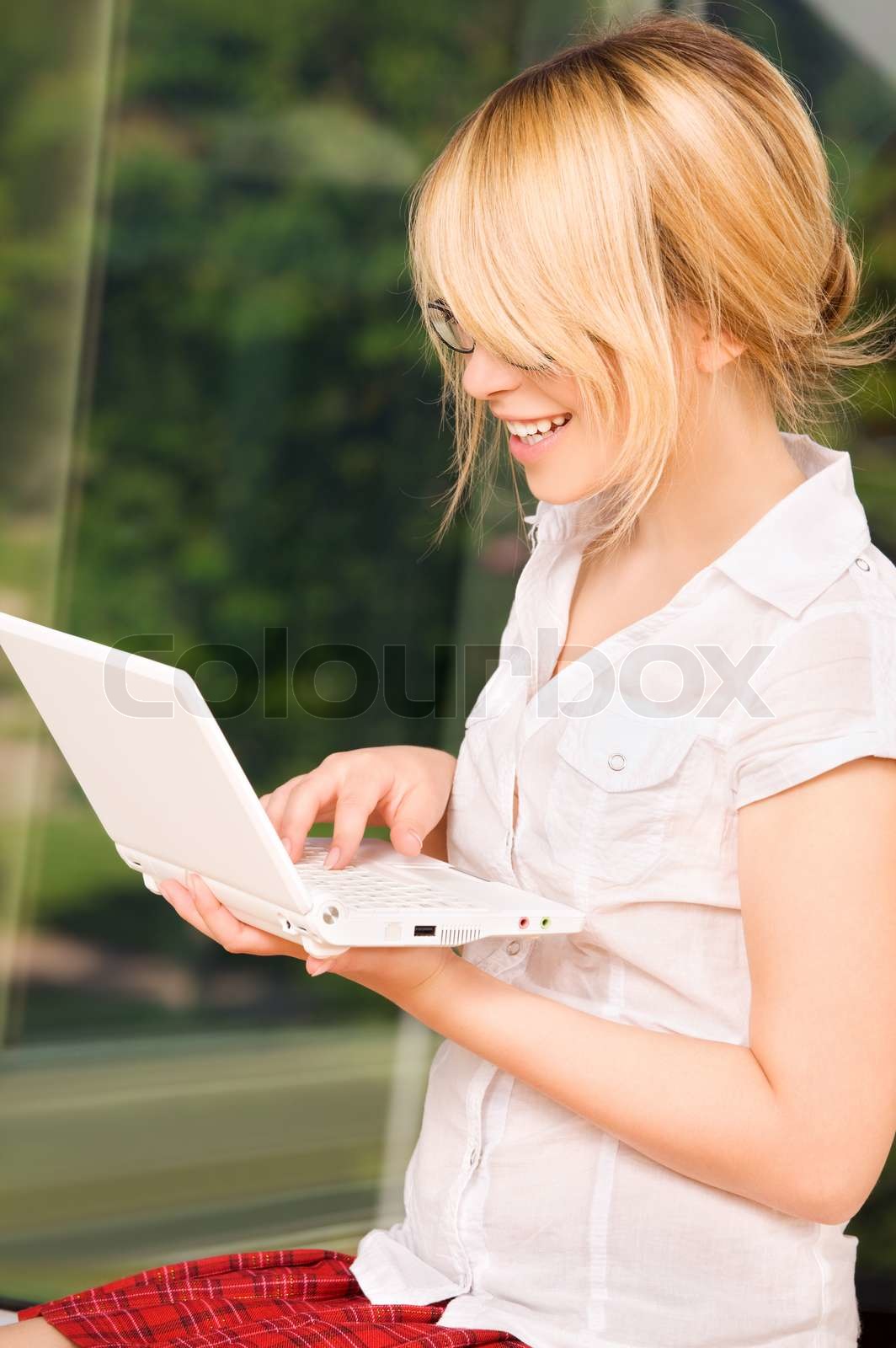picture of office girl with laptop computer | Stock image | Colourbox