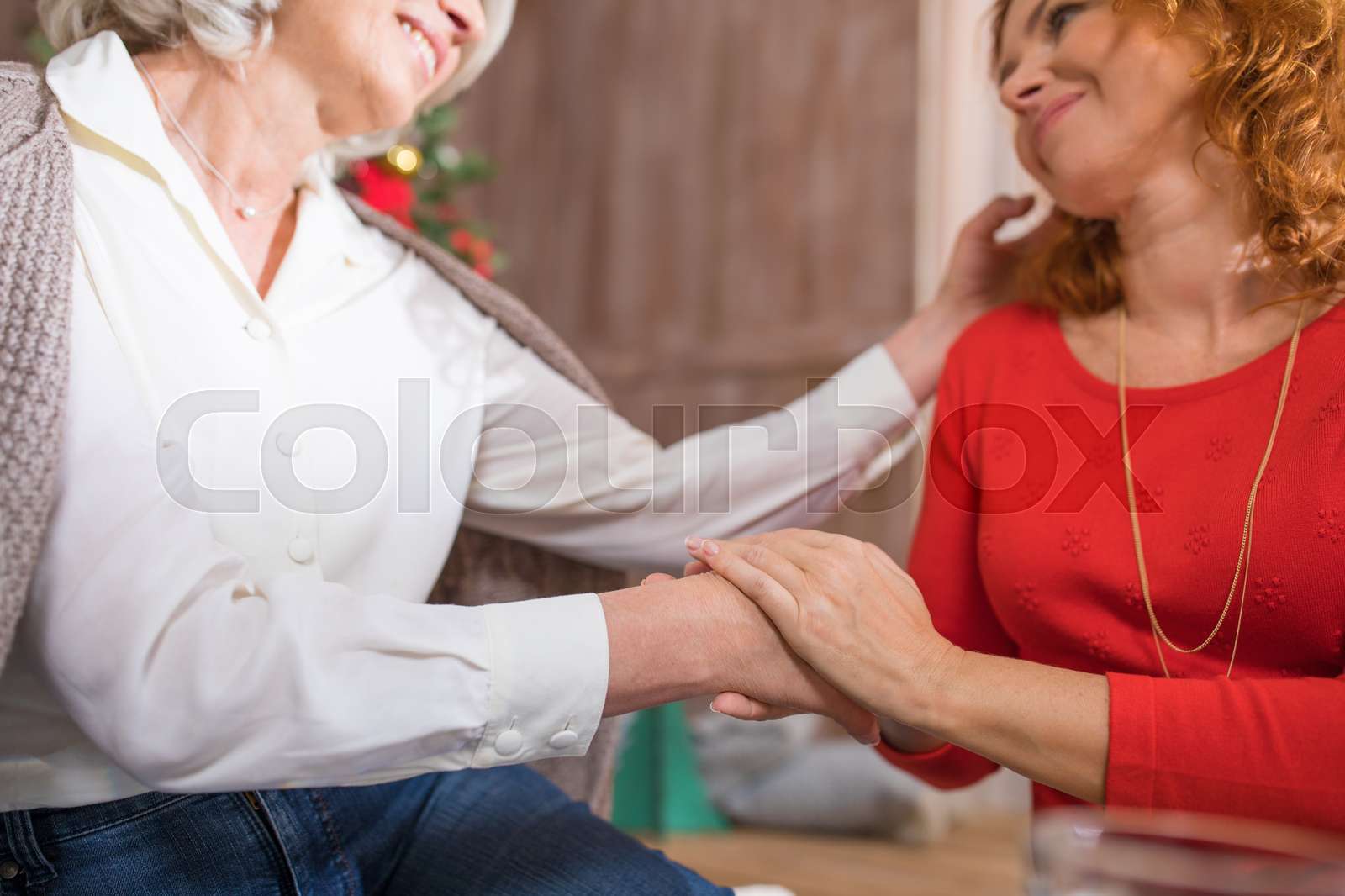 Women holding hands | Stock image | Colourbox