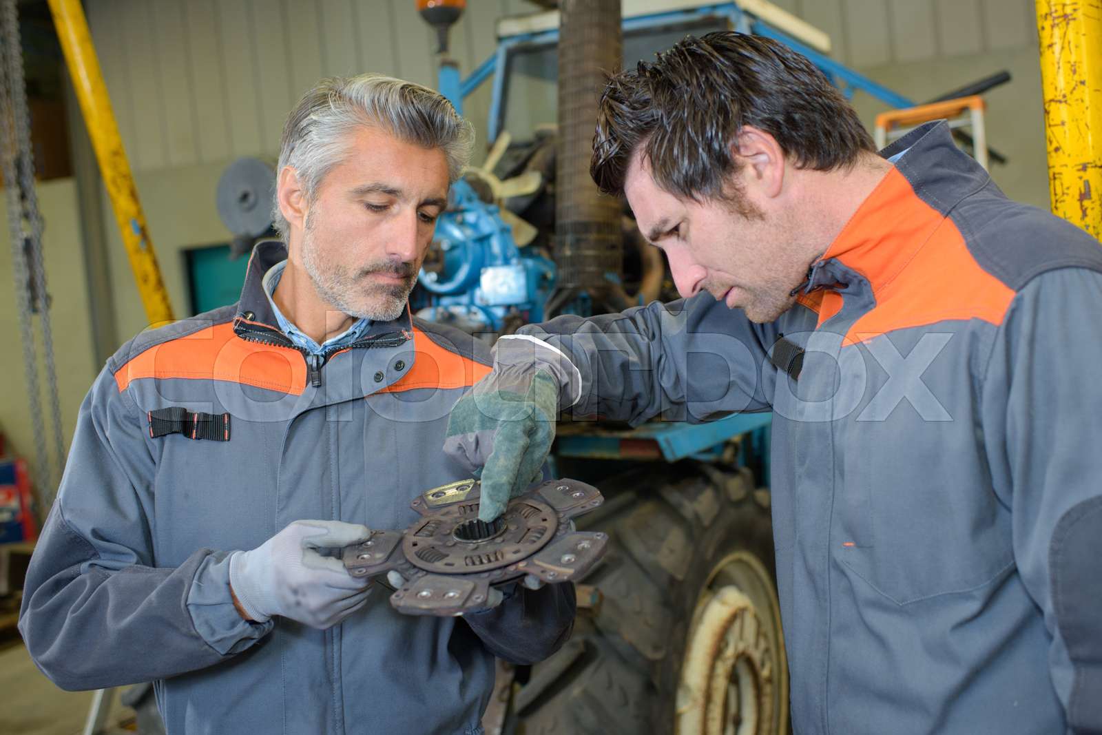fixing the tractor | Stock image | Colourbox