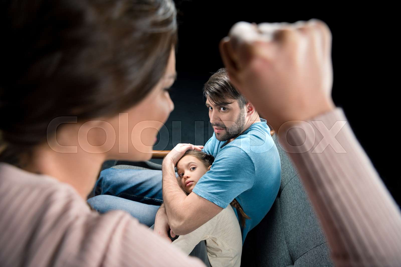 father protecting daughter from aggressive mother, family violence ...