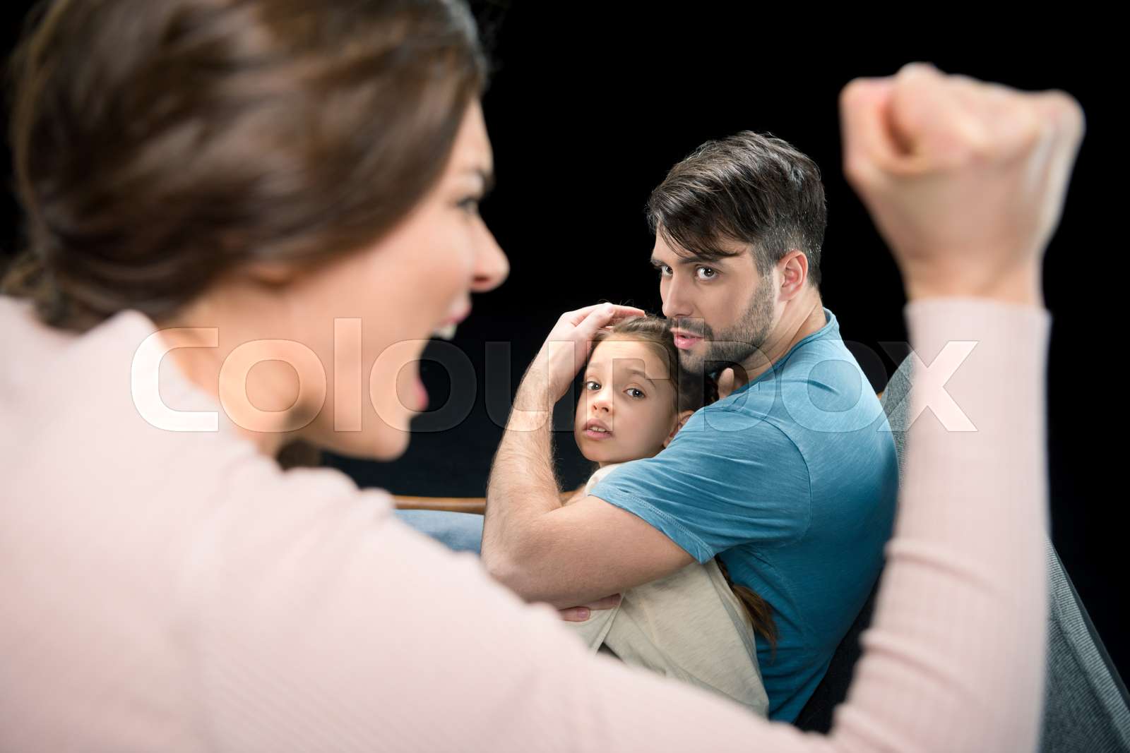 father protecting daughter from aggressive mother, family violence ...