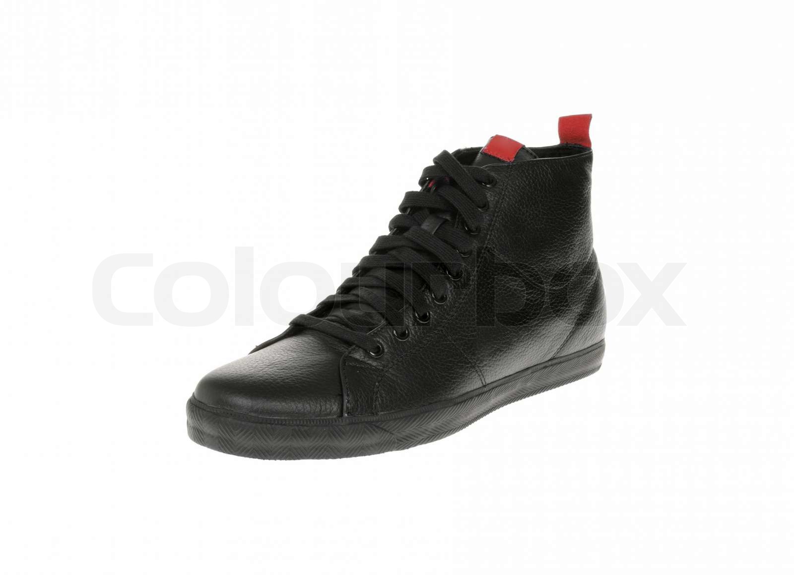 sorte sko isoleret på en hvid baggrund | Stock foto | Colourbox