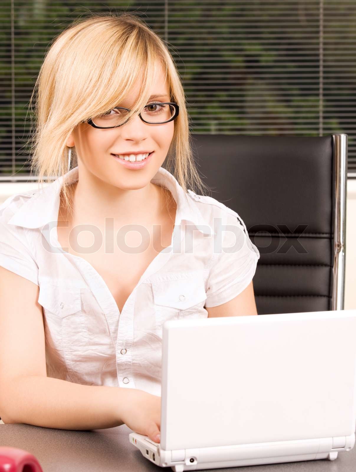 picture of office girl with laptop computer | Stock image | Colourbox