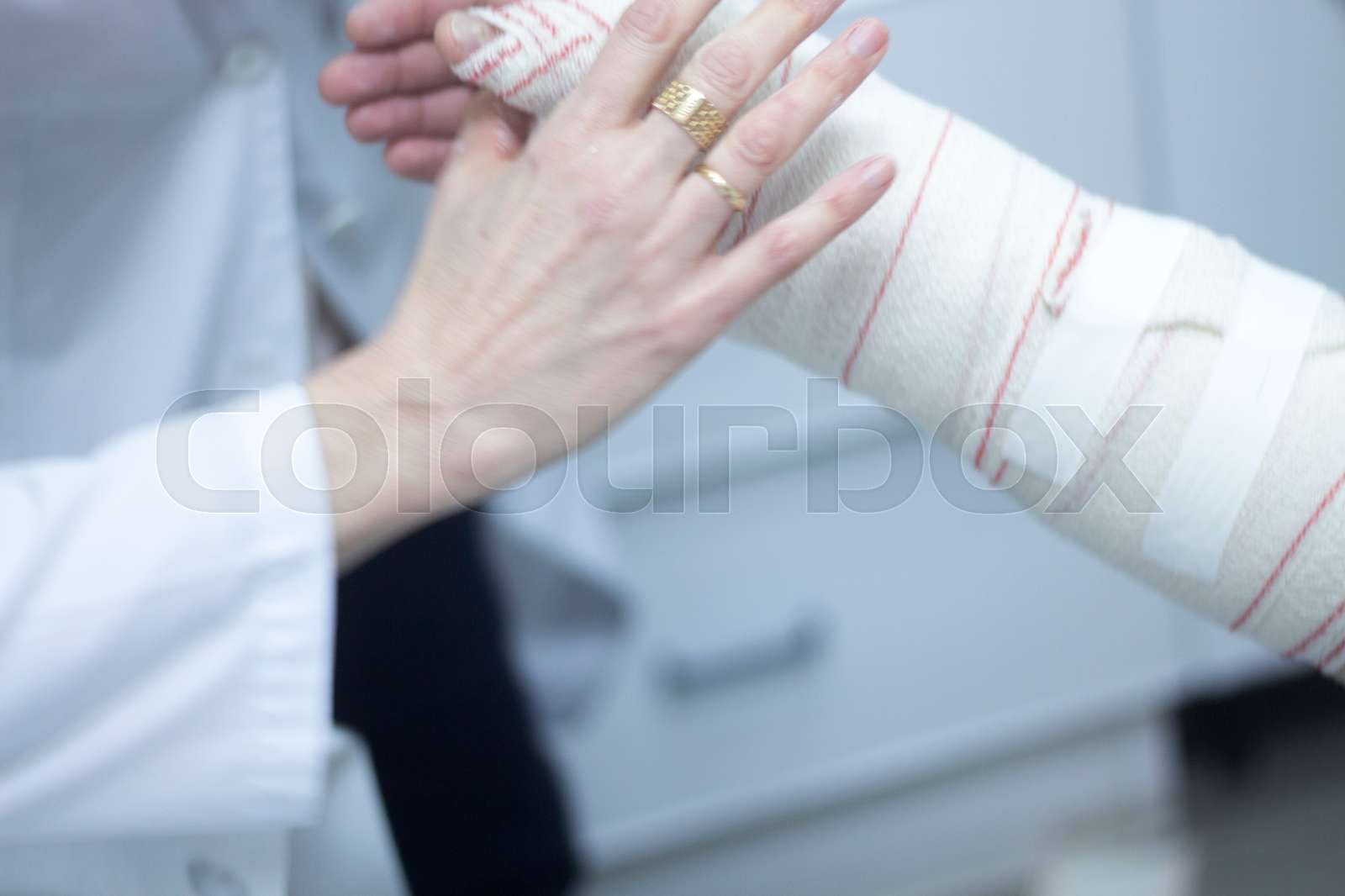 Doctor patient plaster cast | Stock image | Colourbox