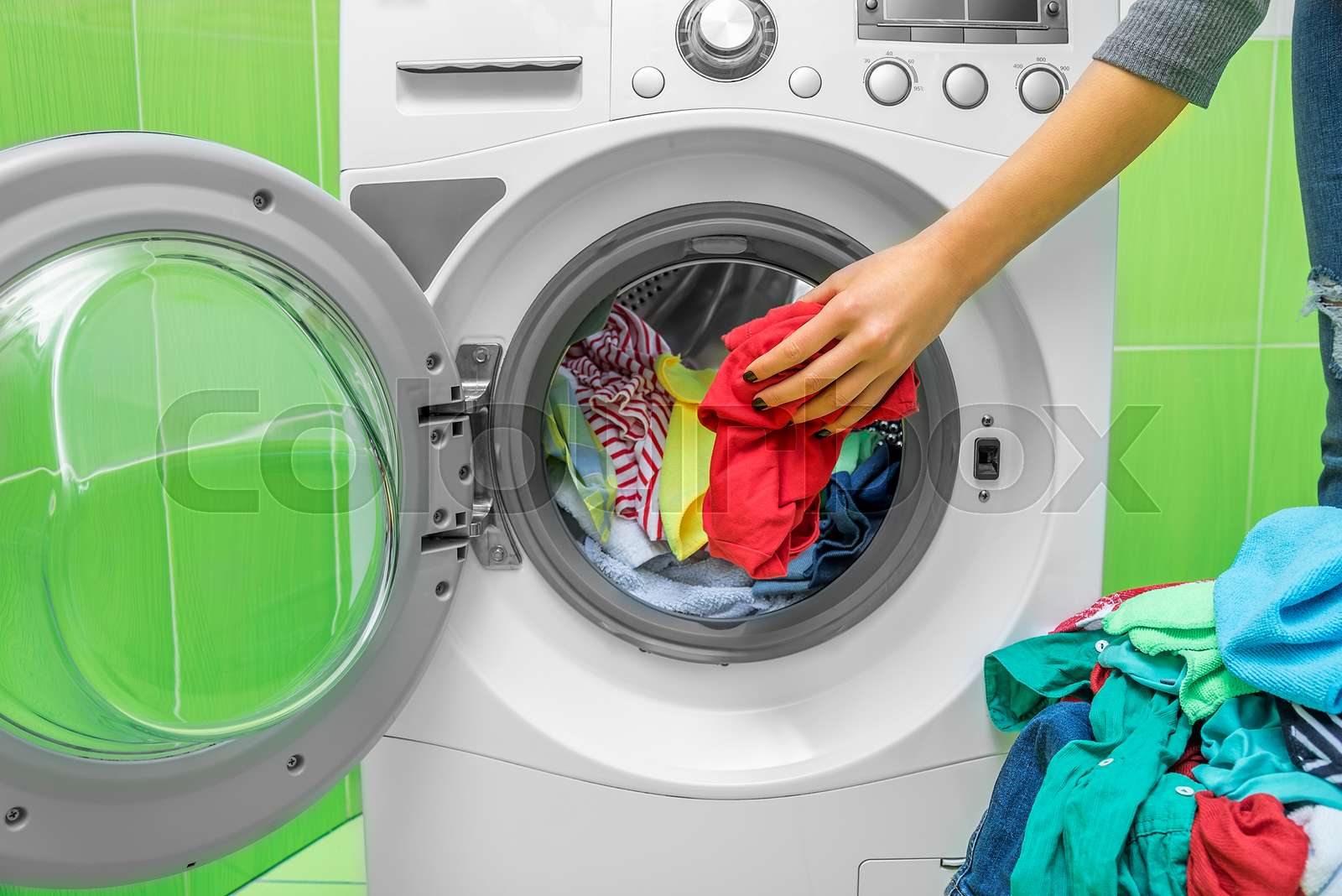 Preparing the wash cycle. | Stock image | Colourbox