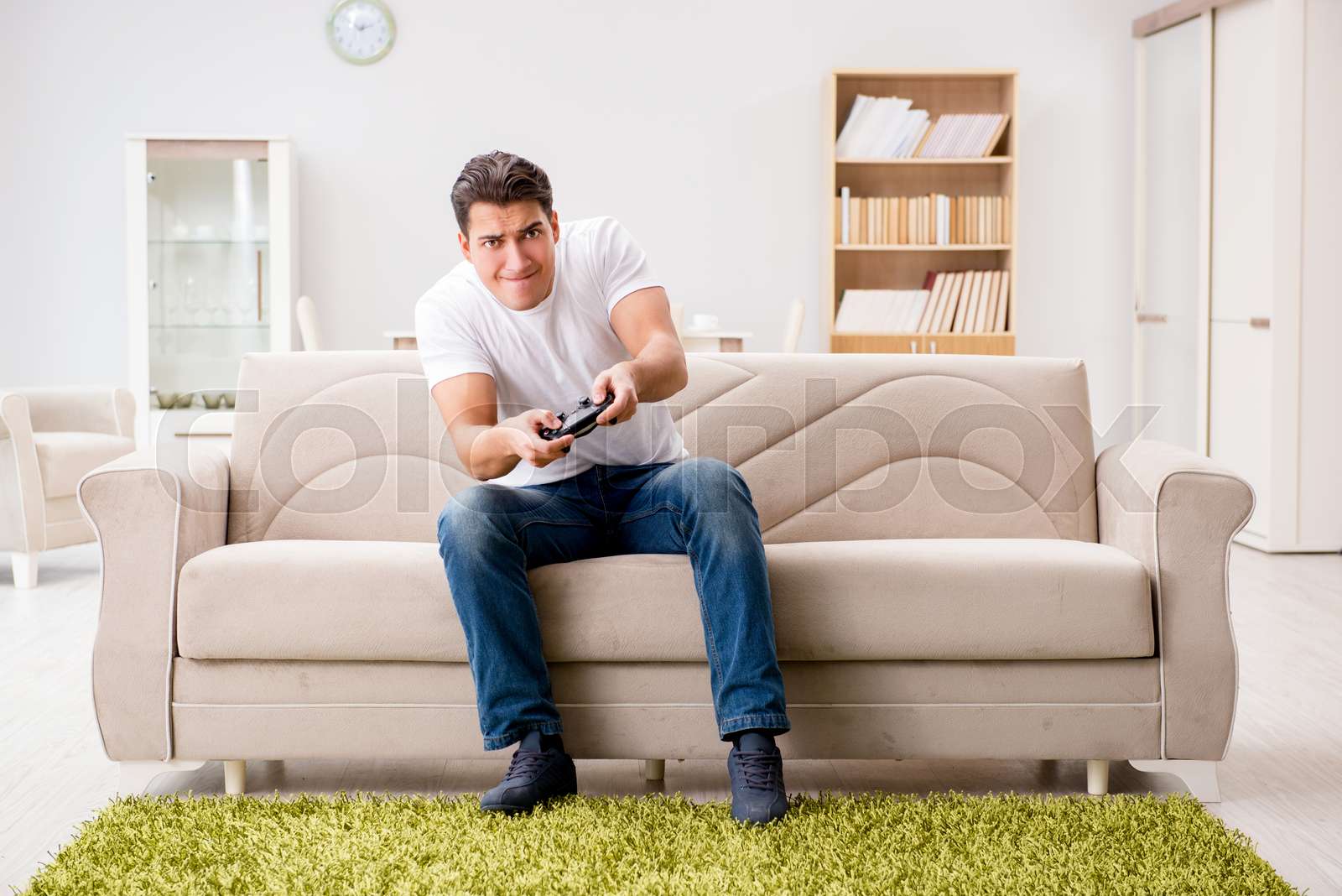 Man addicted to computer games | Stock image | Colourbox