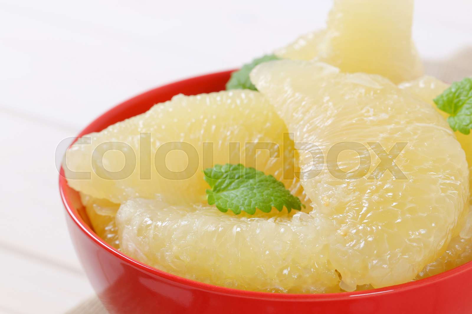 peeled pomelo segments | Stock image | Colourbox