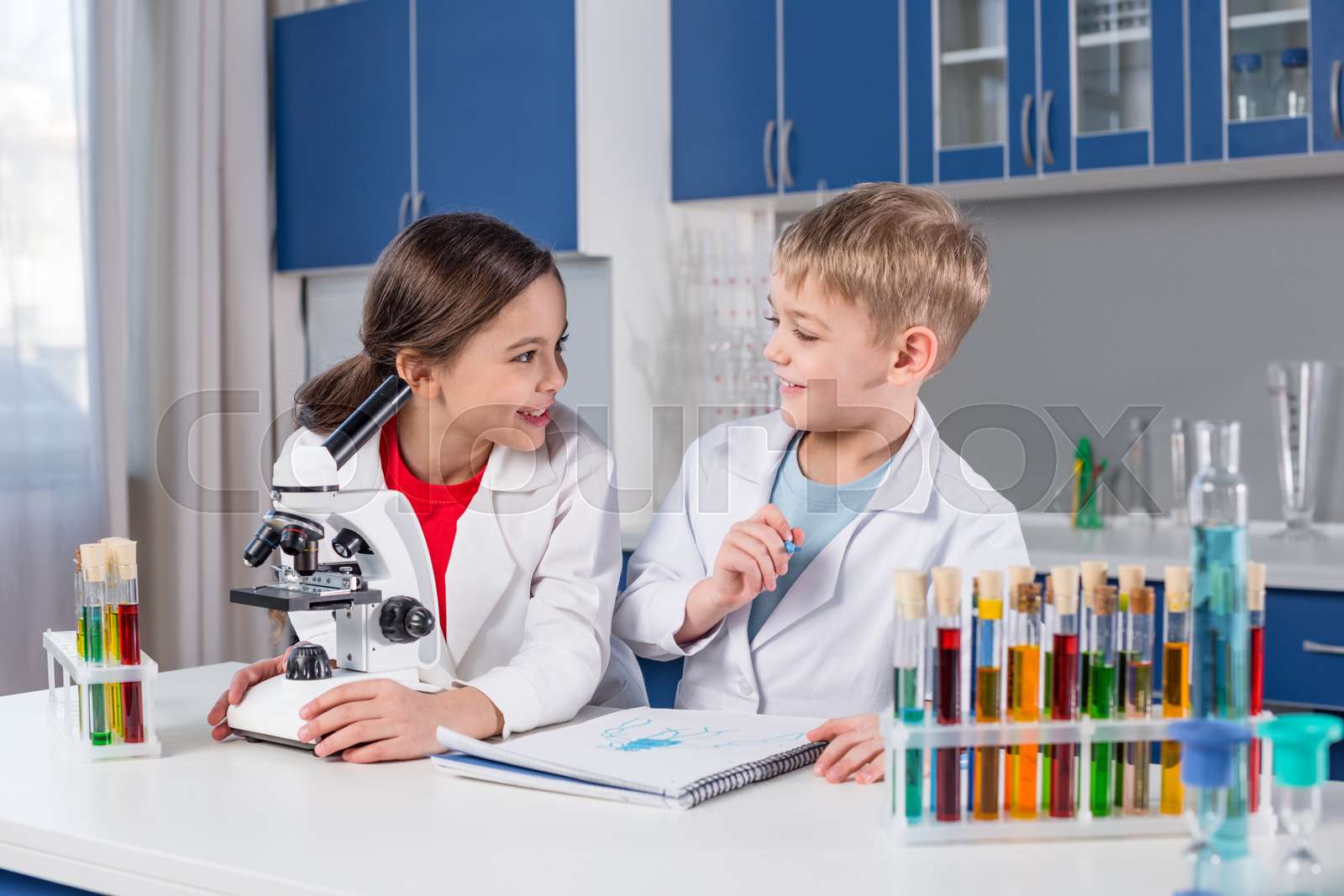 Kids in chemical laboratory | Stock image | Colourbox