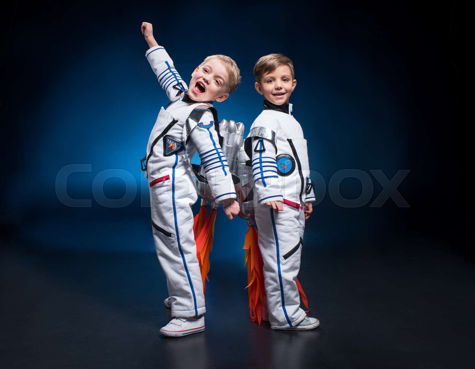 Kids in space suits | Stock image | Colourbox