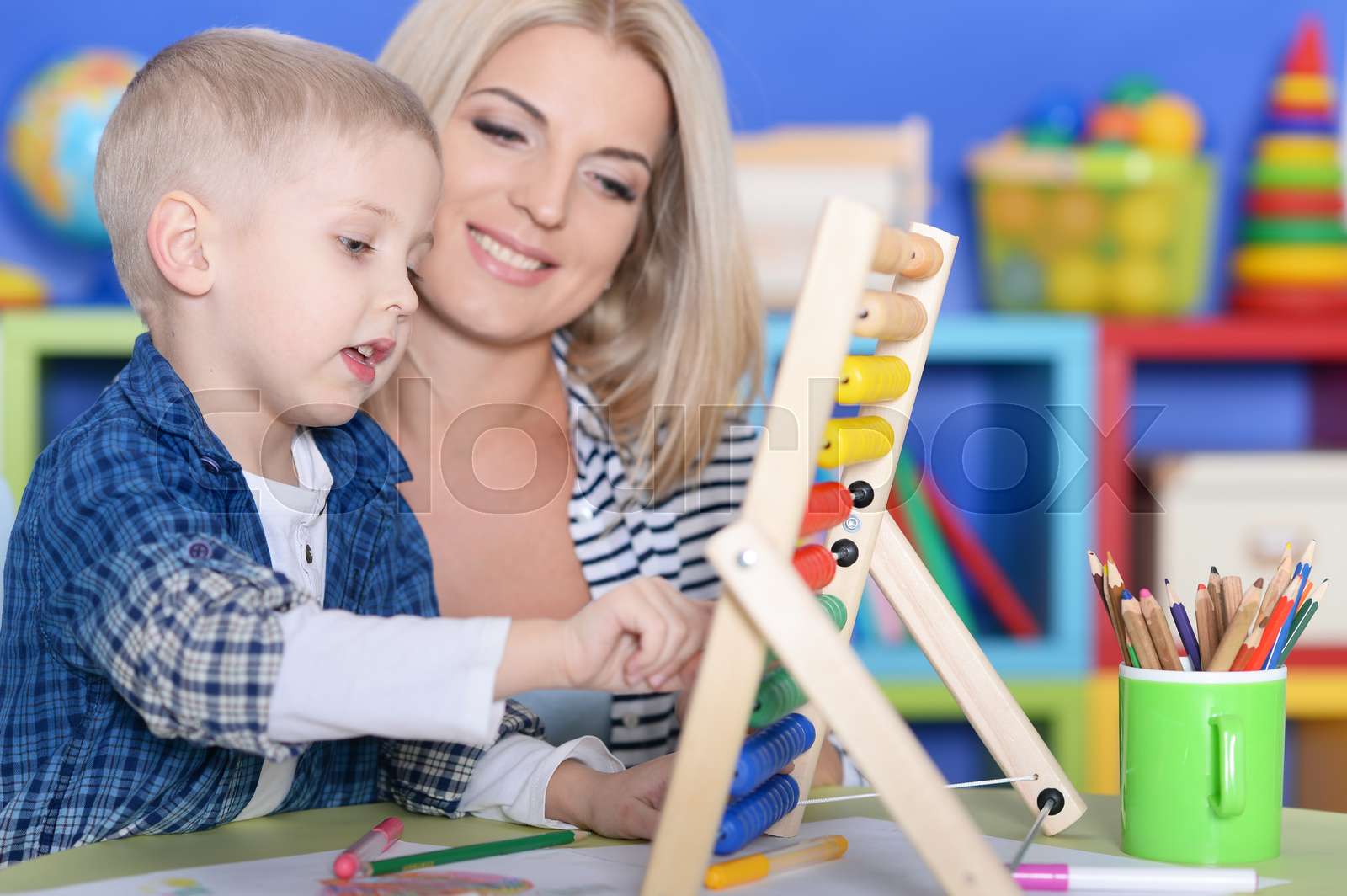 Mother teaches son to count | Stock image | Colourbox