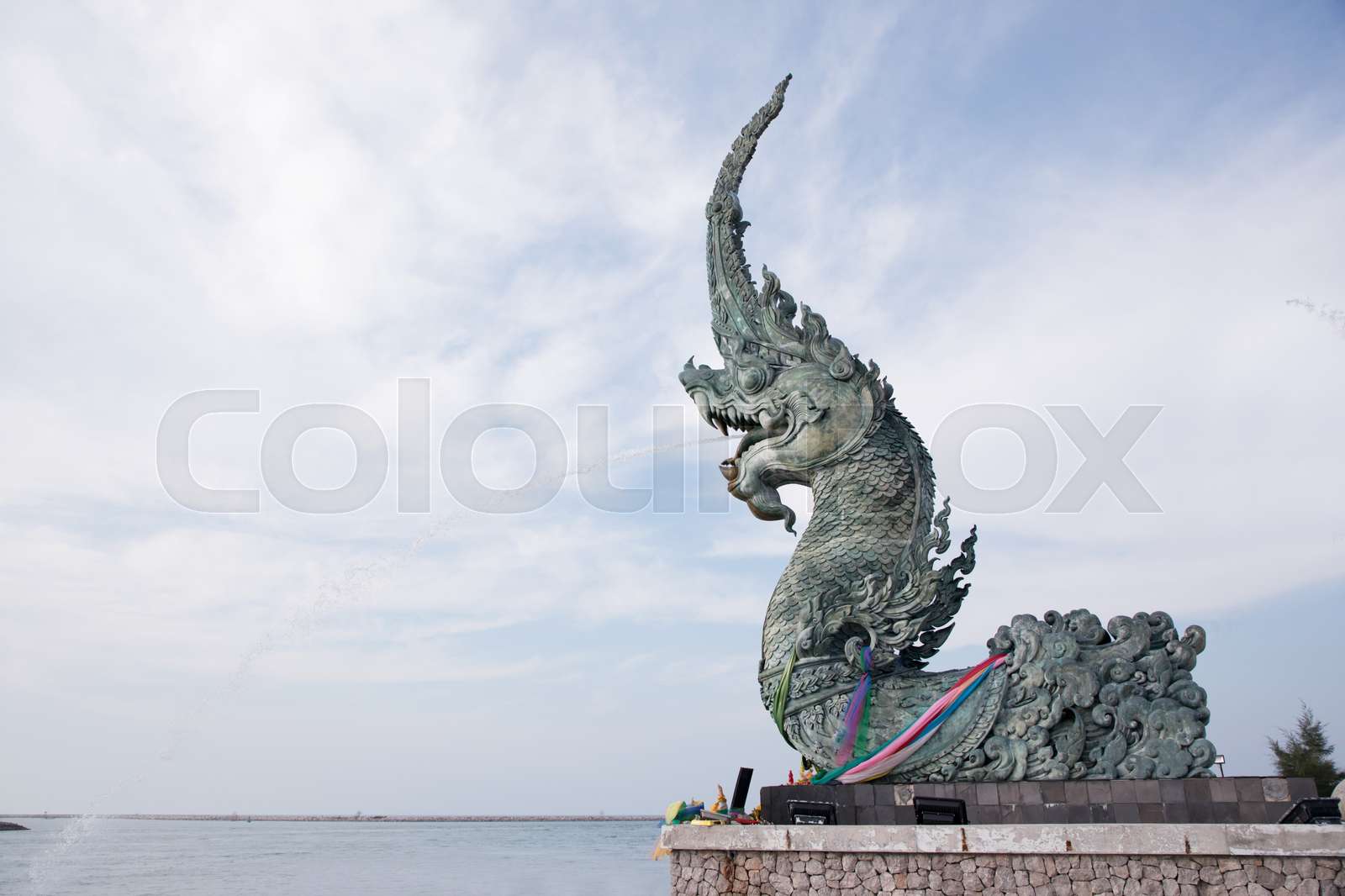 Naga statue spray water | Stock image | Colourbox