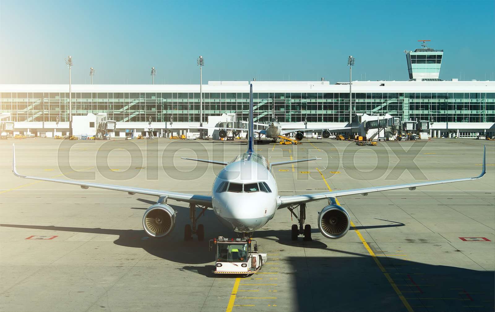 TUG Pushback tractor with Aircraft on the runway in airport. | Stock ...