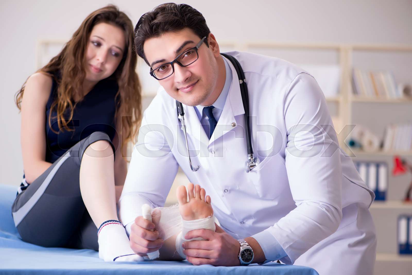 Traumatologist is taking care of the patient | Stock image | Colourbox