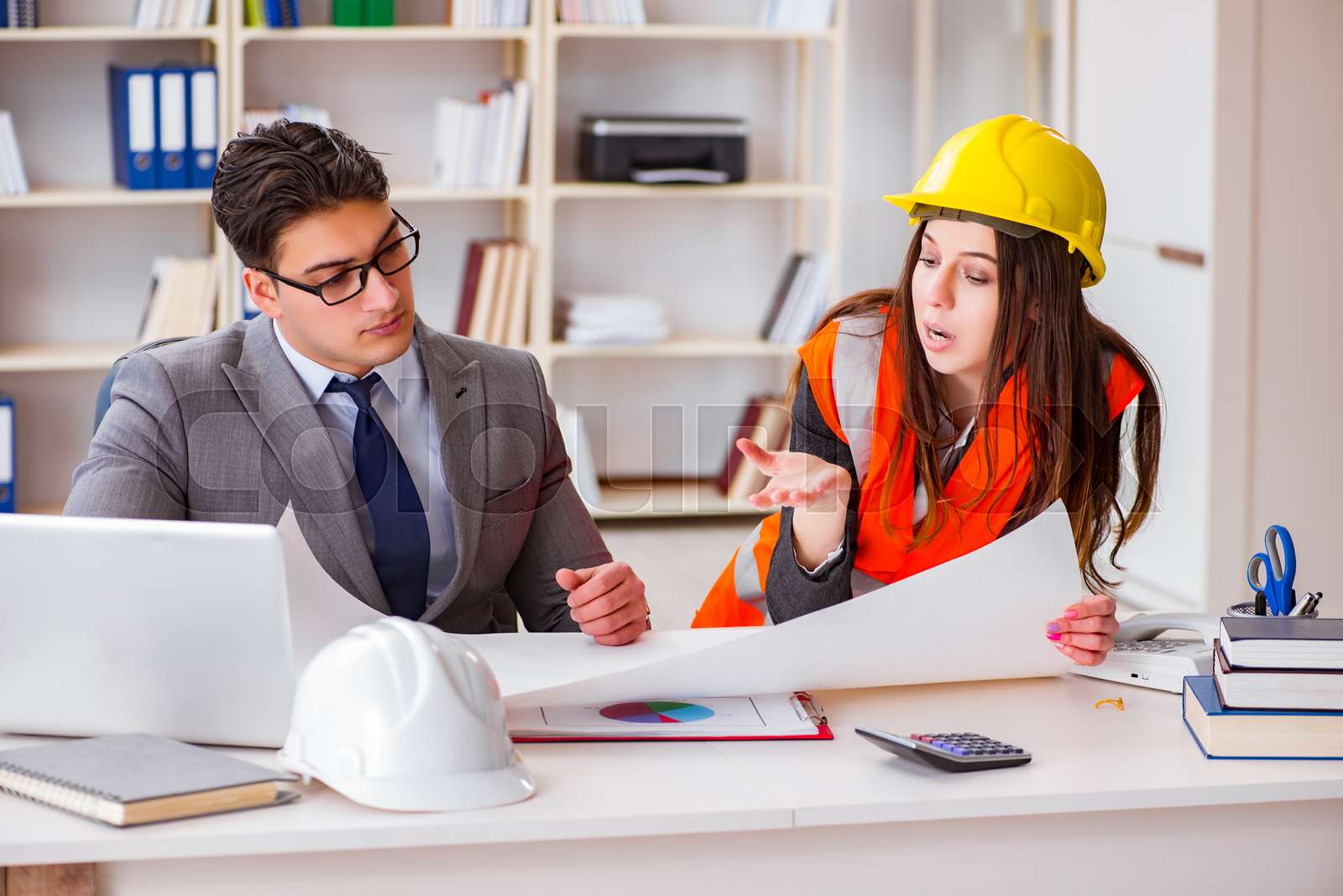 Construction foreman supervisor reviewing drawings | Stock image ...